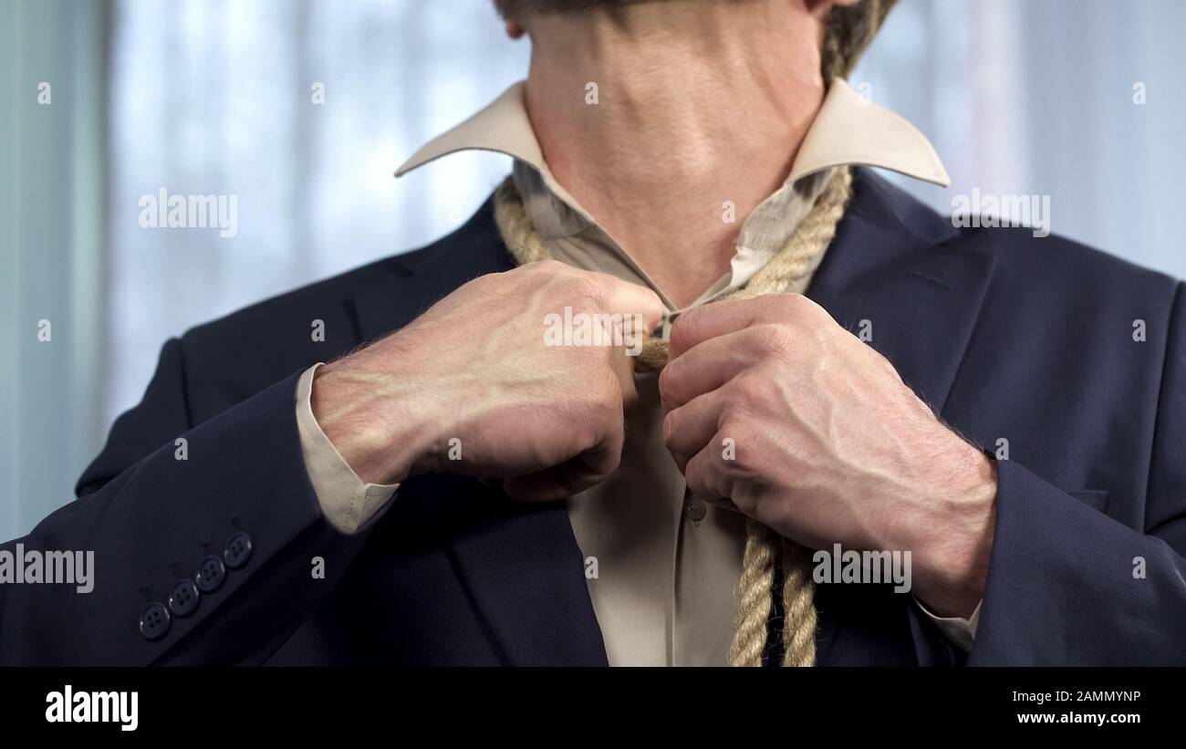 Man trying remove death rope from his neck, binding commitment ...
