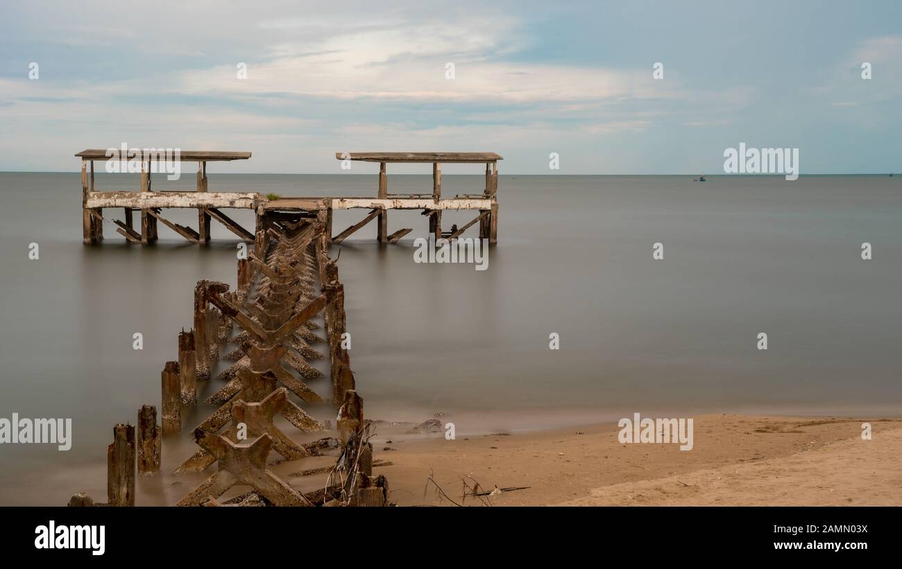 Dilapidated old fishing dock collapsing into the sea in Pak Nam Pran on ...