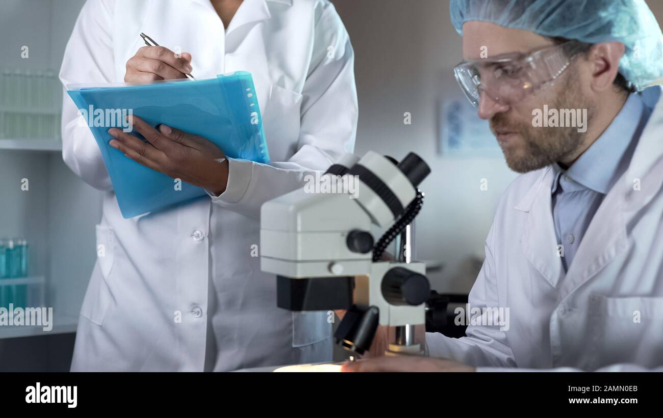 Observation under microscope hi-res stock photography and images - Alamy