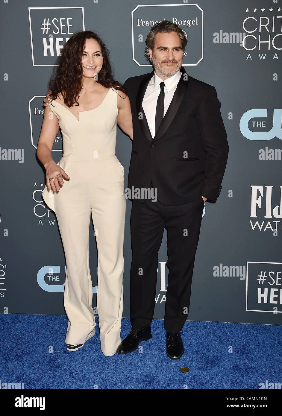 SANTA MONICA, CA - JANUARY 12: Rain Phoenix (L) and Joaquin Phoenix ...