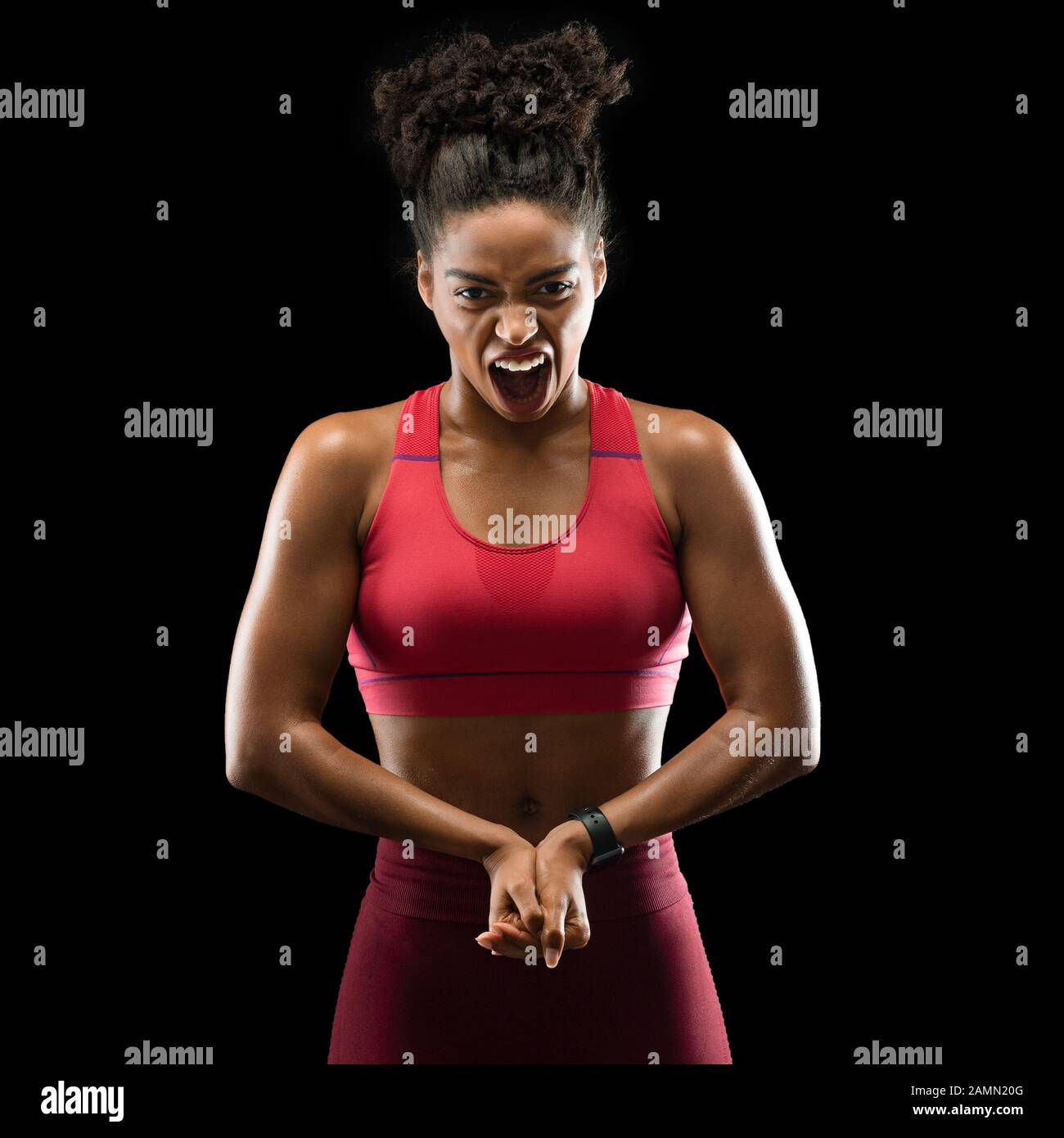 Aggressive woman bodybuilder posing on camera, flexing muscles Stock ...