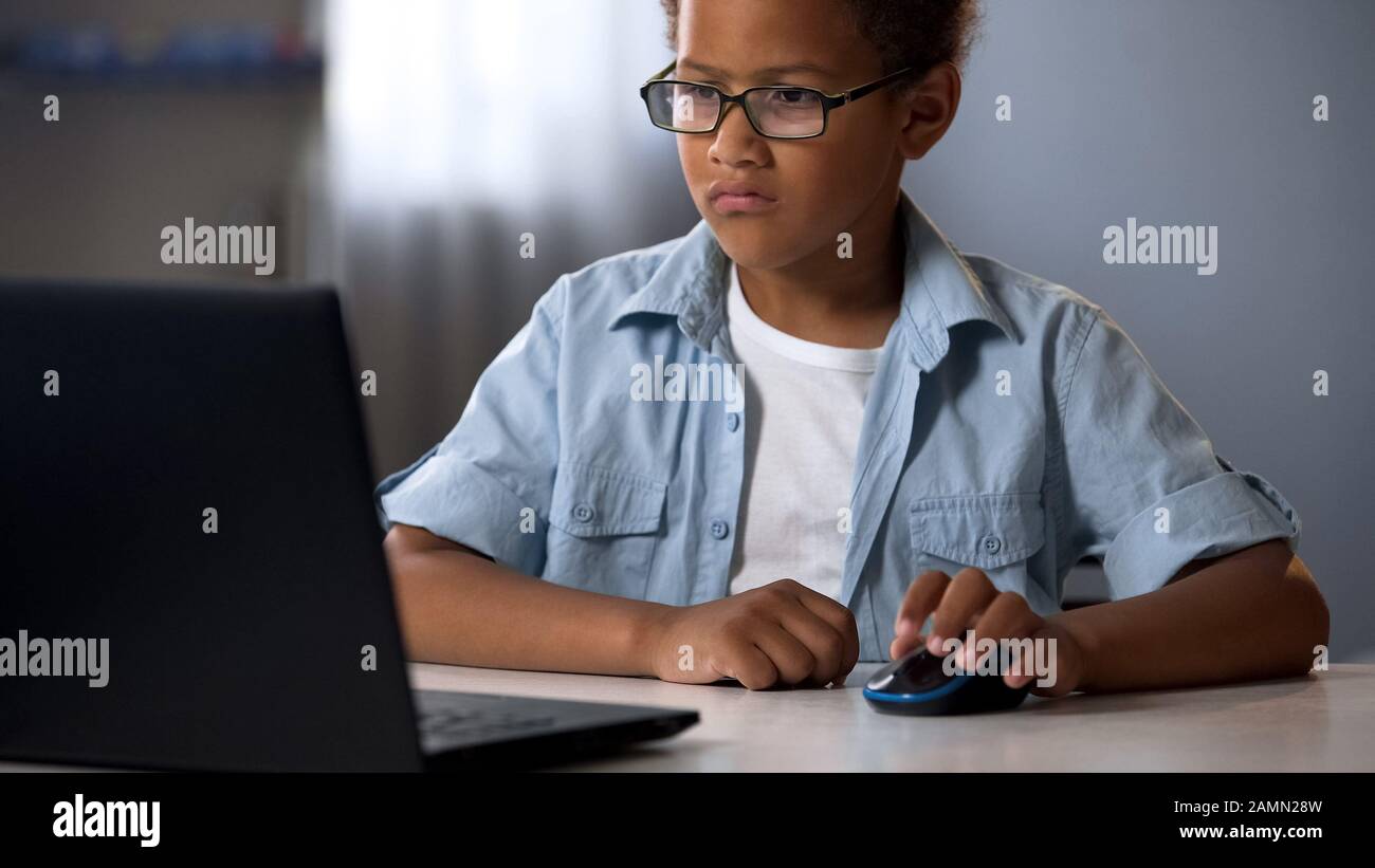 Advanced child sitting at computer, IT literacy lessons for children ...