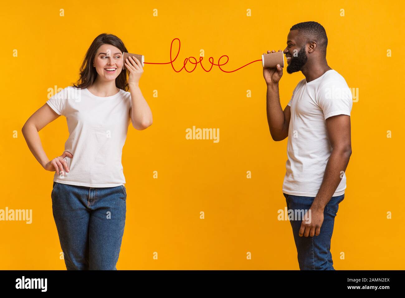 Girl Listening Man Through Cup High Resolution Stock Photography and ...