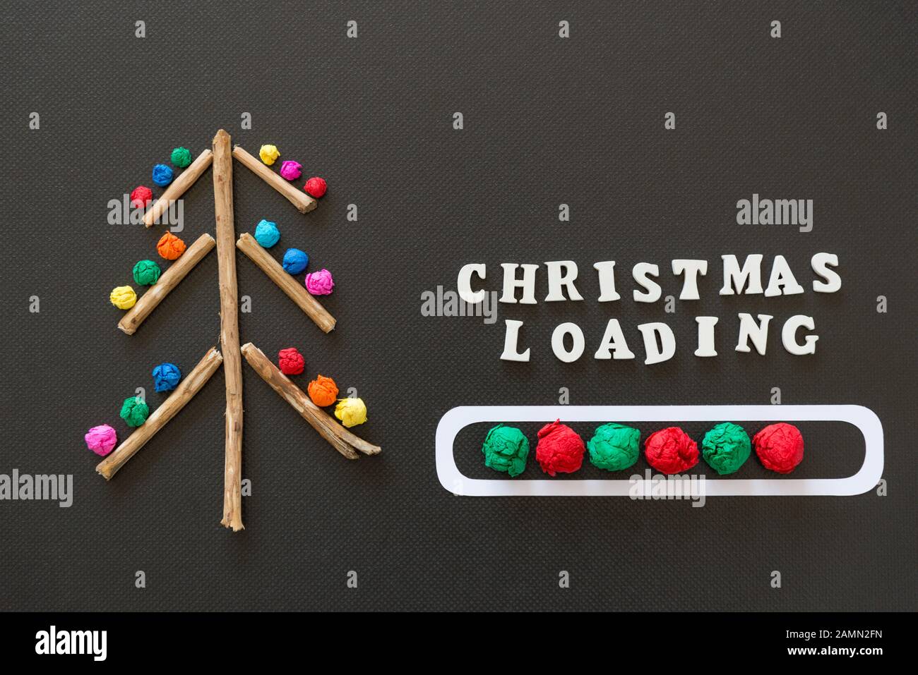 colorful christmas tree with loading bar on black background Stock ...