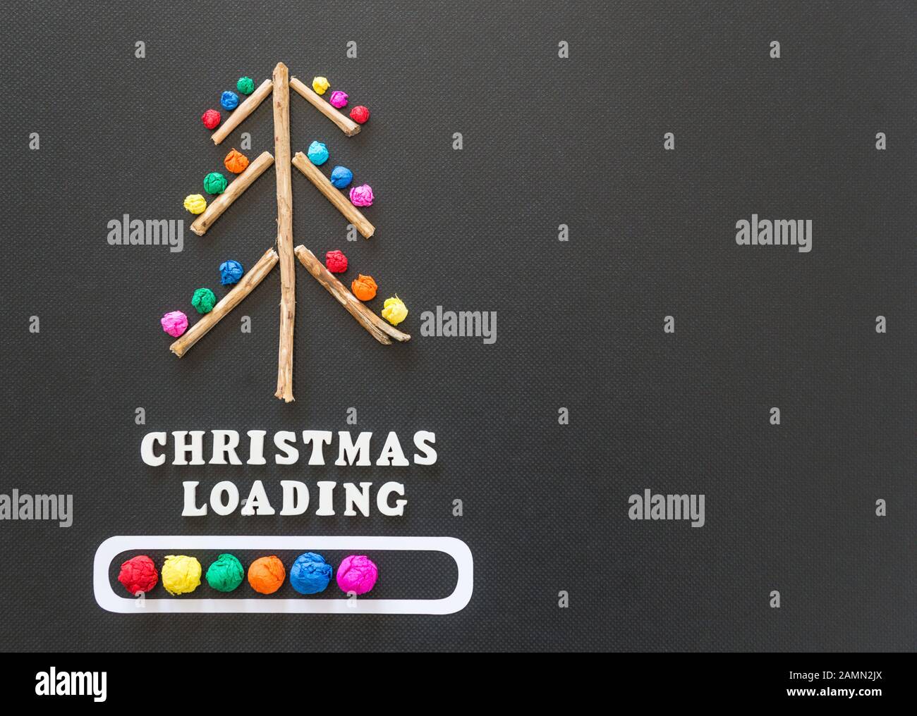 colorful christmas tree with loading bar on black background Stock ...