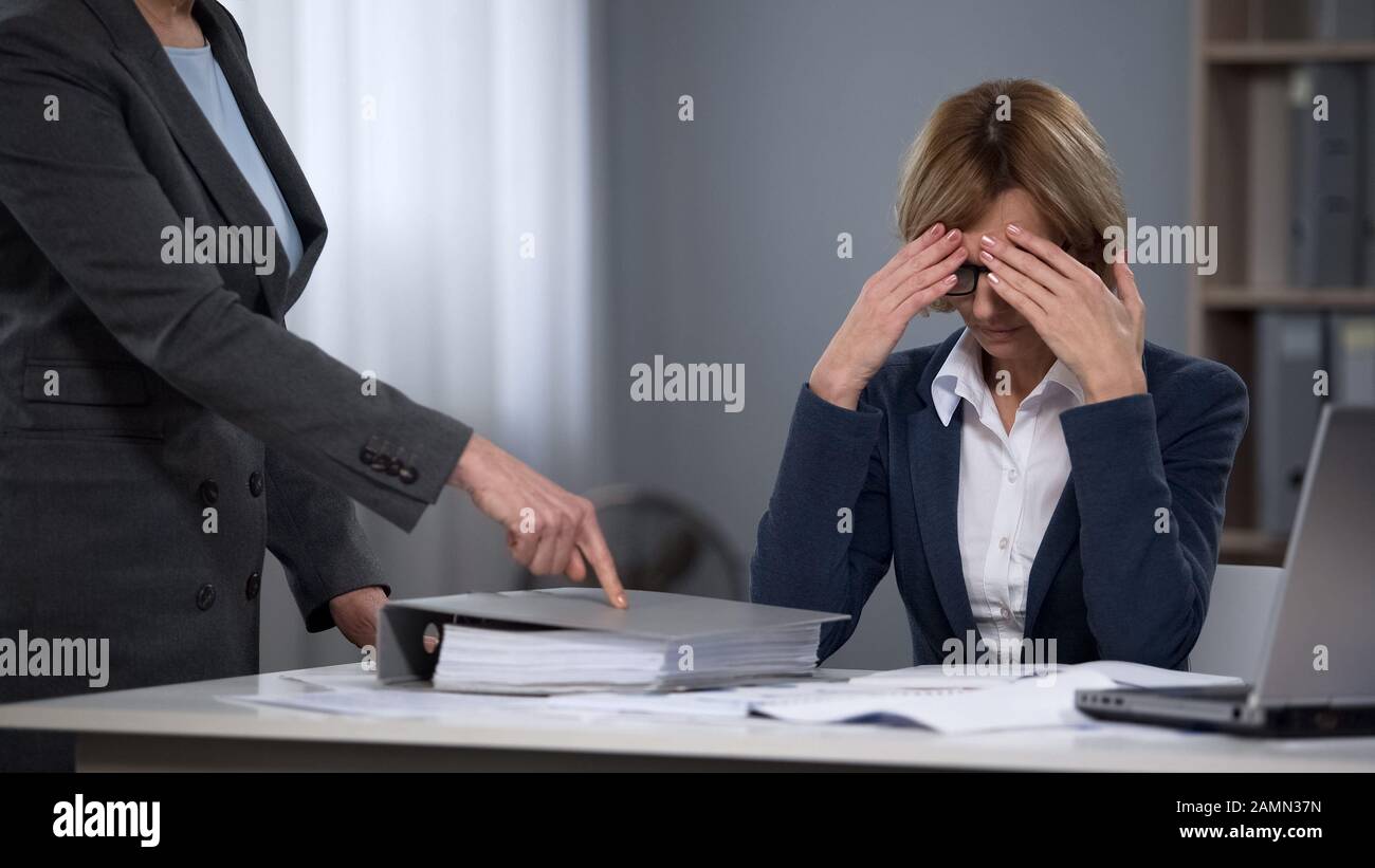 Tired stressed executive office worker feeling boss pressure, overtime ...