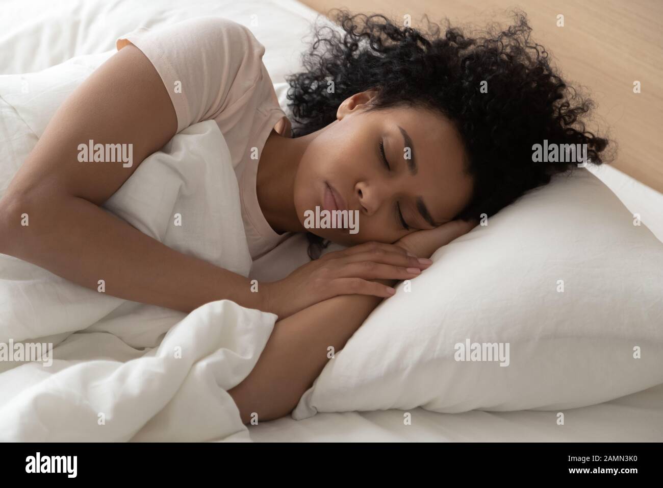 African woman sleeping bed hi-res stock photography and images - Alamy