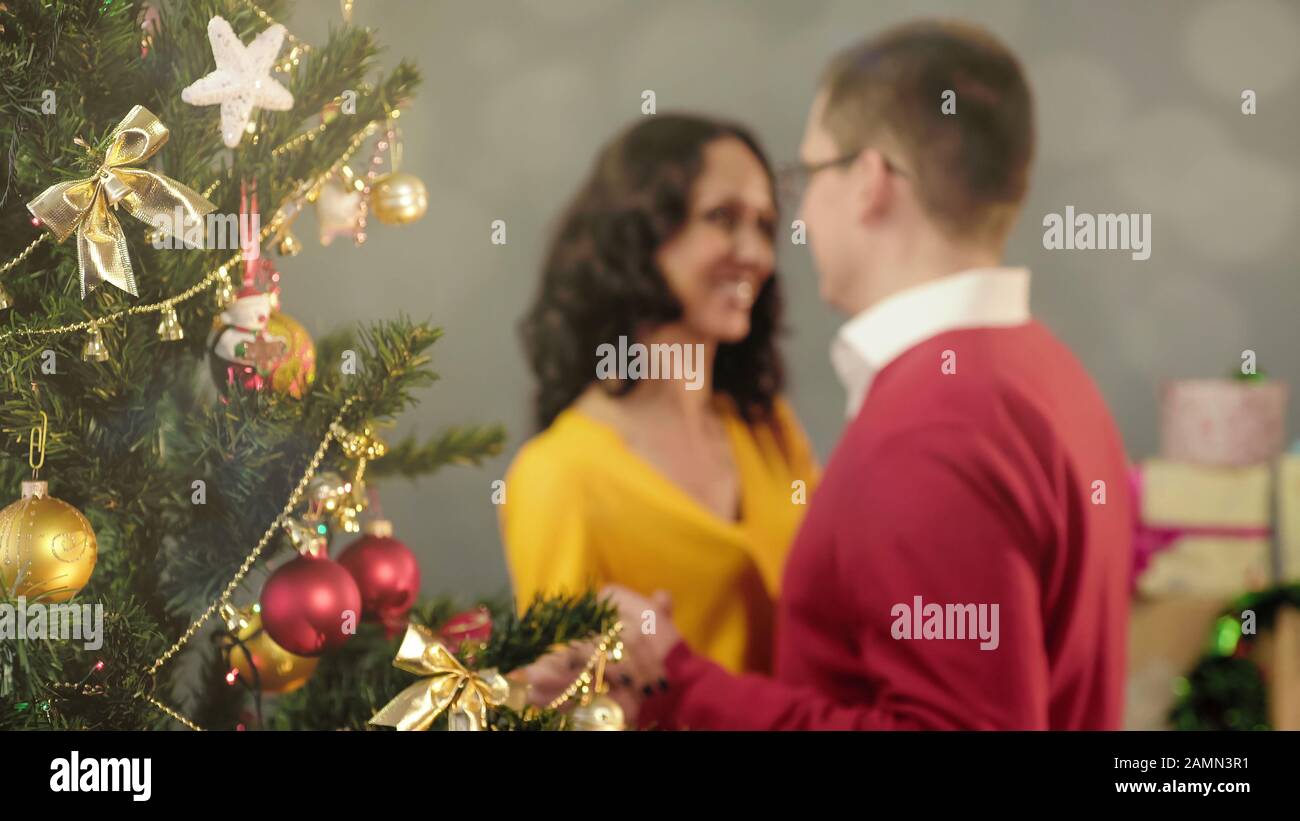 Happy loving couple dancing at Christmas party, togetherness, magic ...