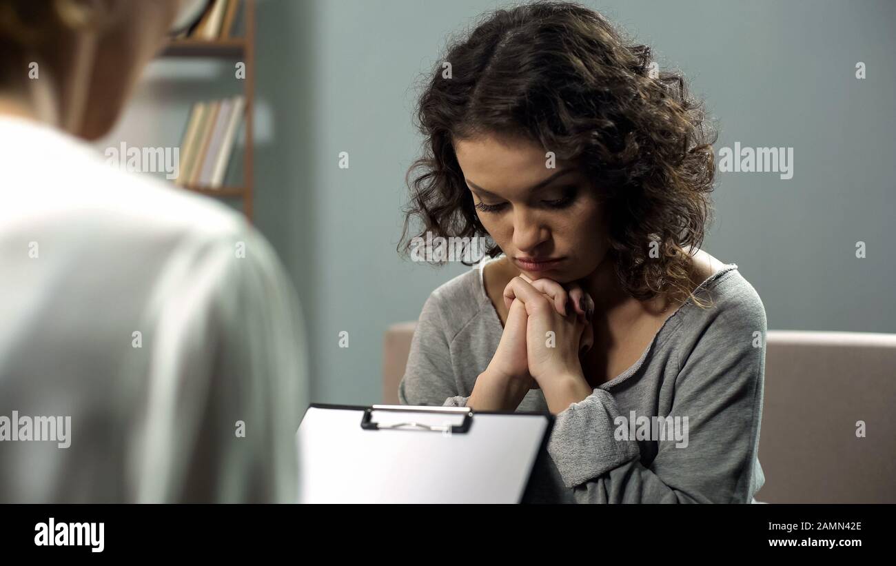 Young woman suffering depression after break-up, psychologist ...