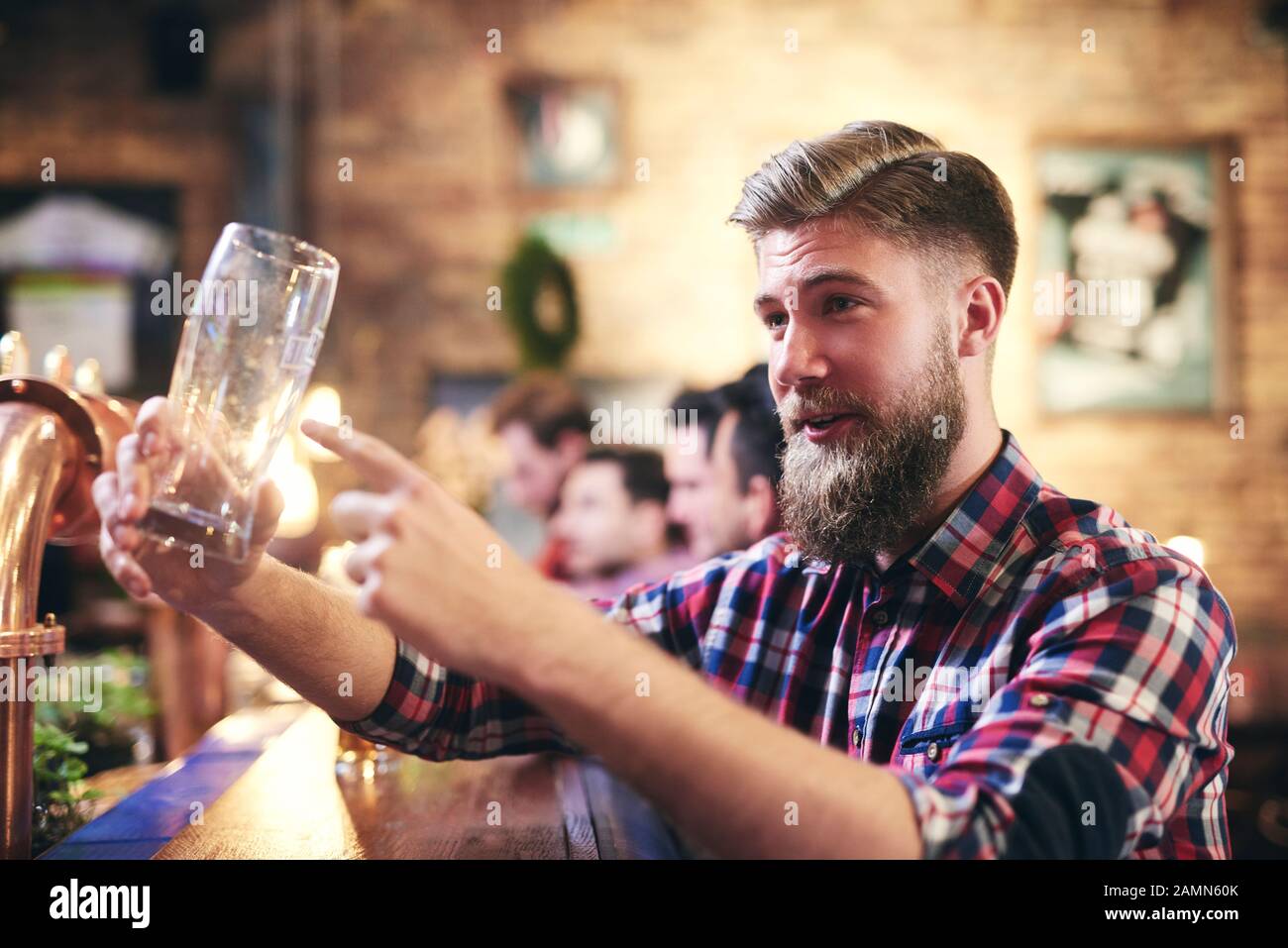 Man ordering drinks hi-res stock photography and images - Alamy