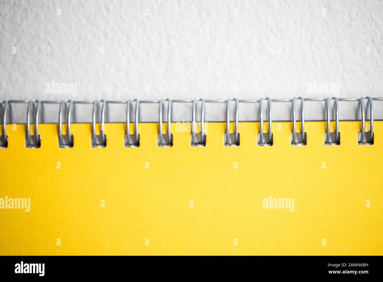 Two tone Yellow and white paper with paper loop Stock Photo - Alamy