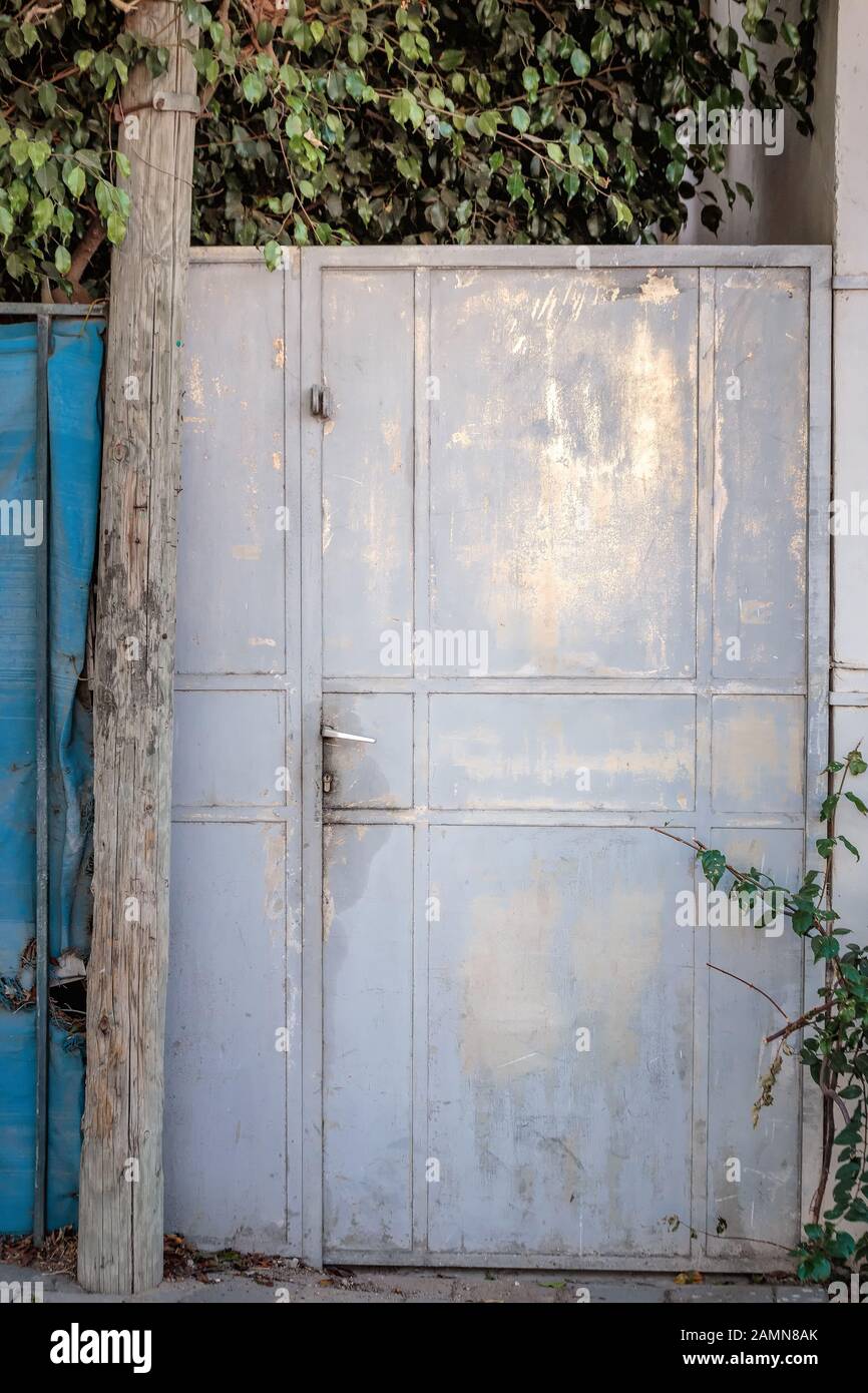 Blue and gold rustic iron gate in Tel Aviv, Israel Stock Photo - Alamy