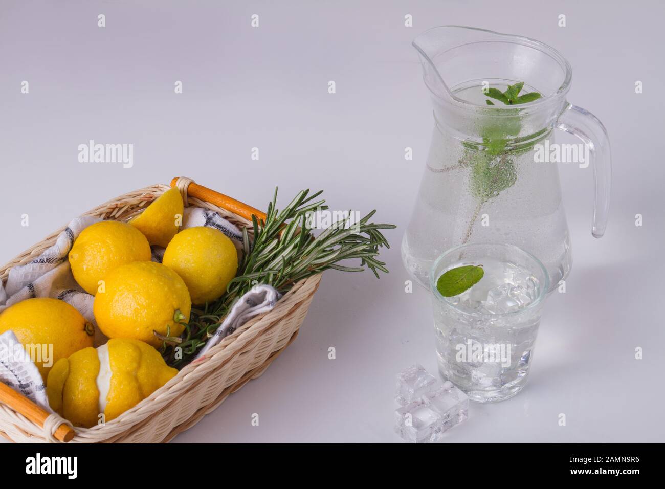 Glass cup ang jug with mint water Stock Photo - Alamy