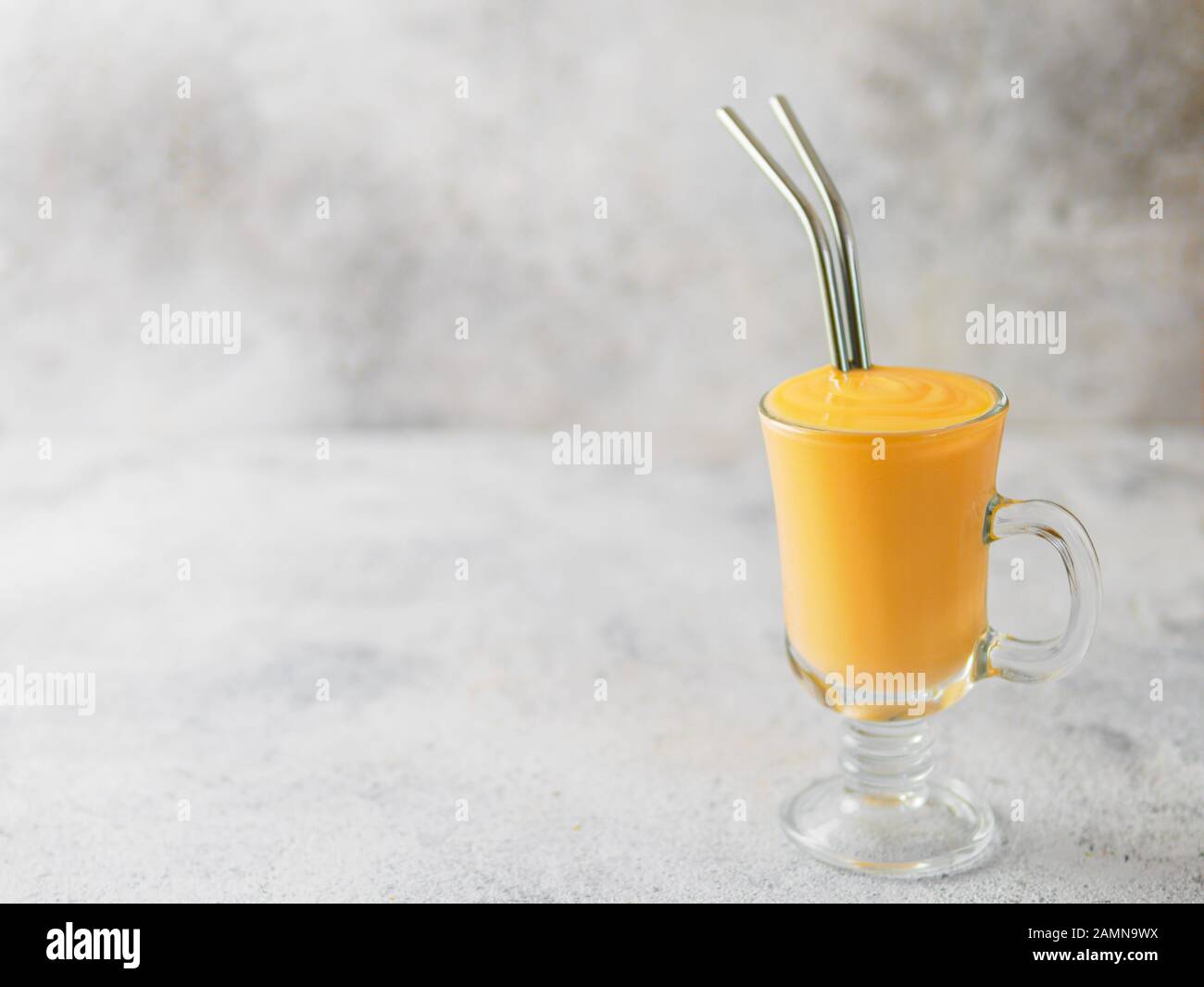 Lassi in glass with straw hi-res stock photography and images - Alamy