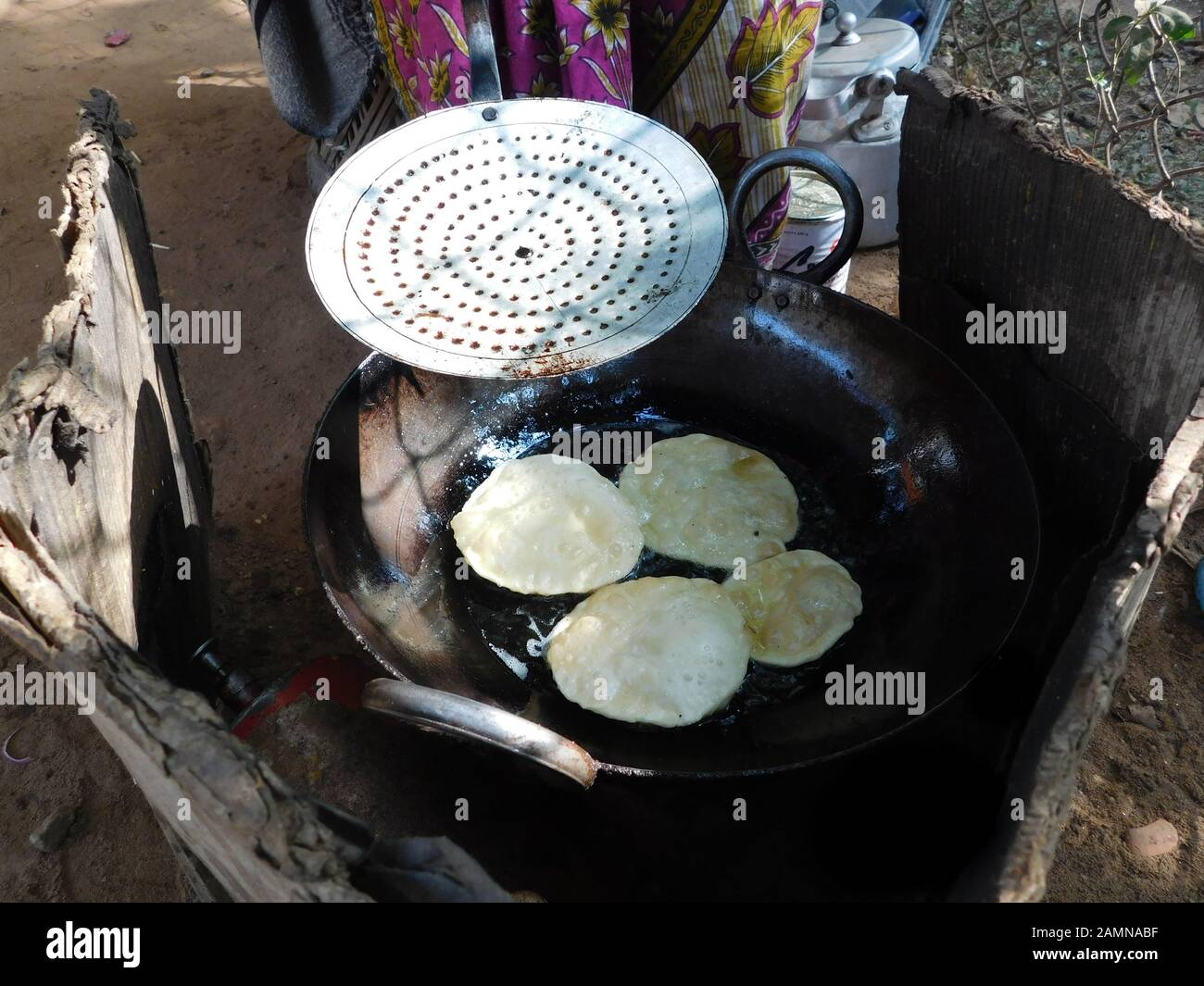 Making of fluffy Phulko Luchi puri cuisine, a traditional Bengali style ...