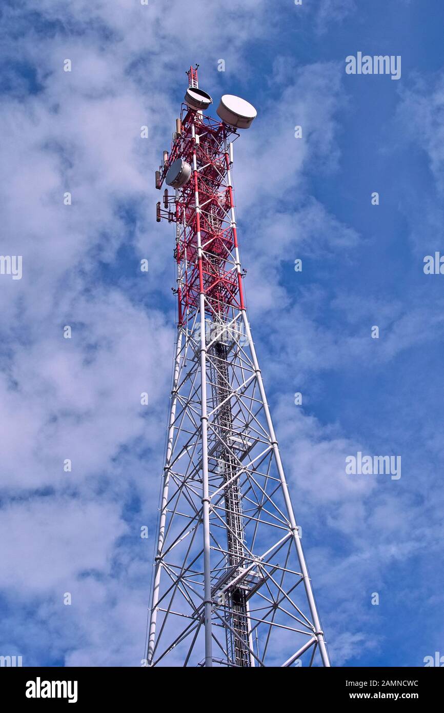 trellis with a few parables and telephone and radio antennas Stock ...