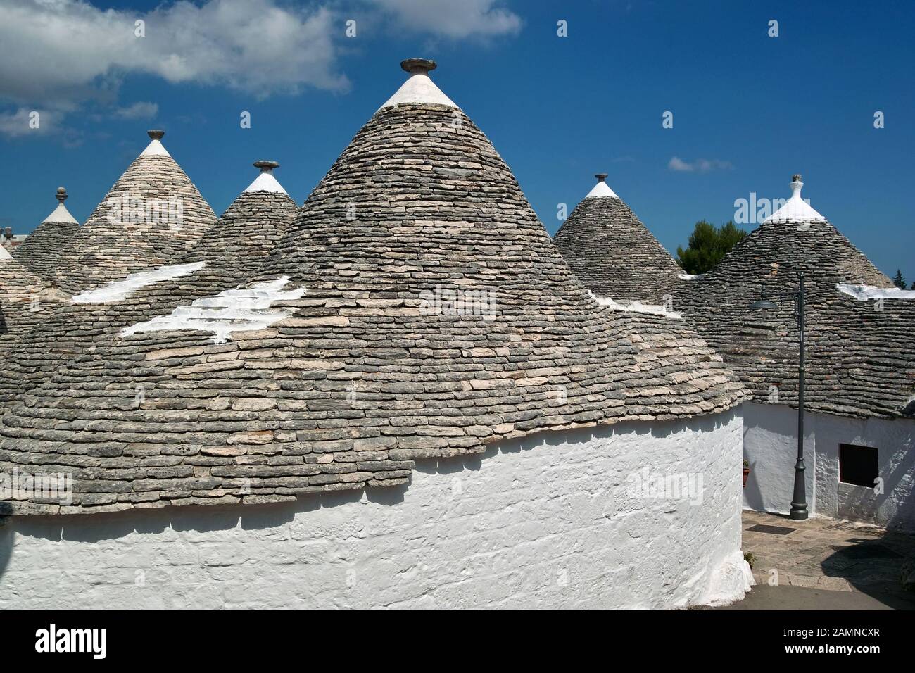 some of the trulli in Alberobello, declared by UNESCO world heritage ...
