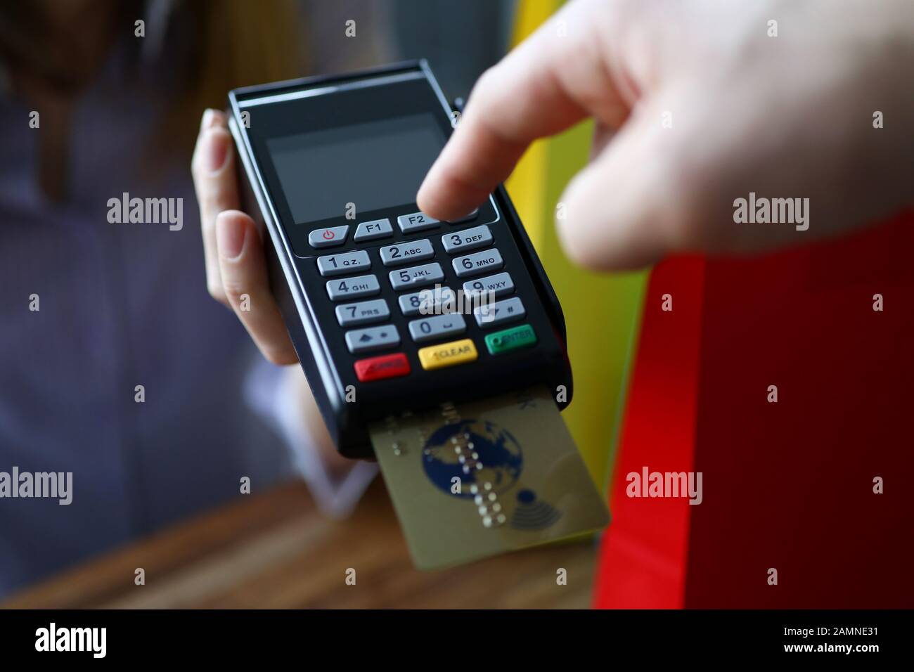 Male hand cuonter push button on modern POS terminal Stock Photo - Alamy