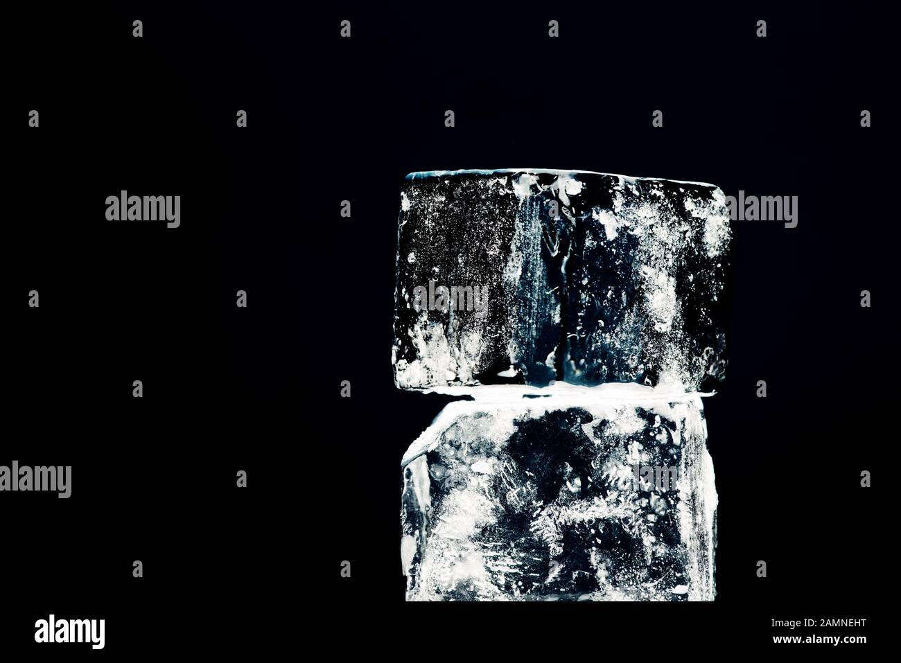 close up view of square ice cubes isolated on black Stock Photo - Alamy