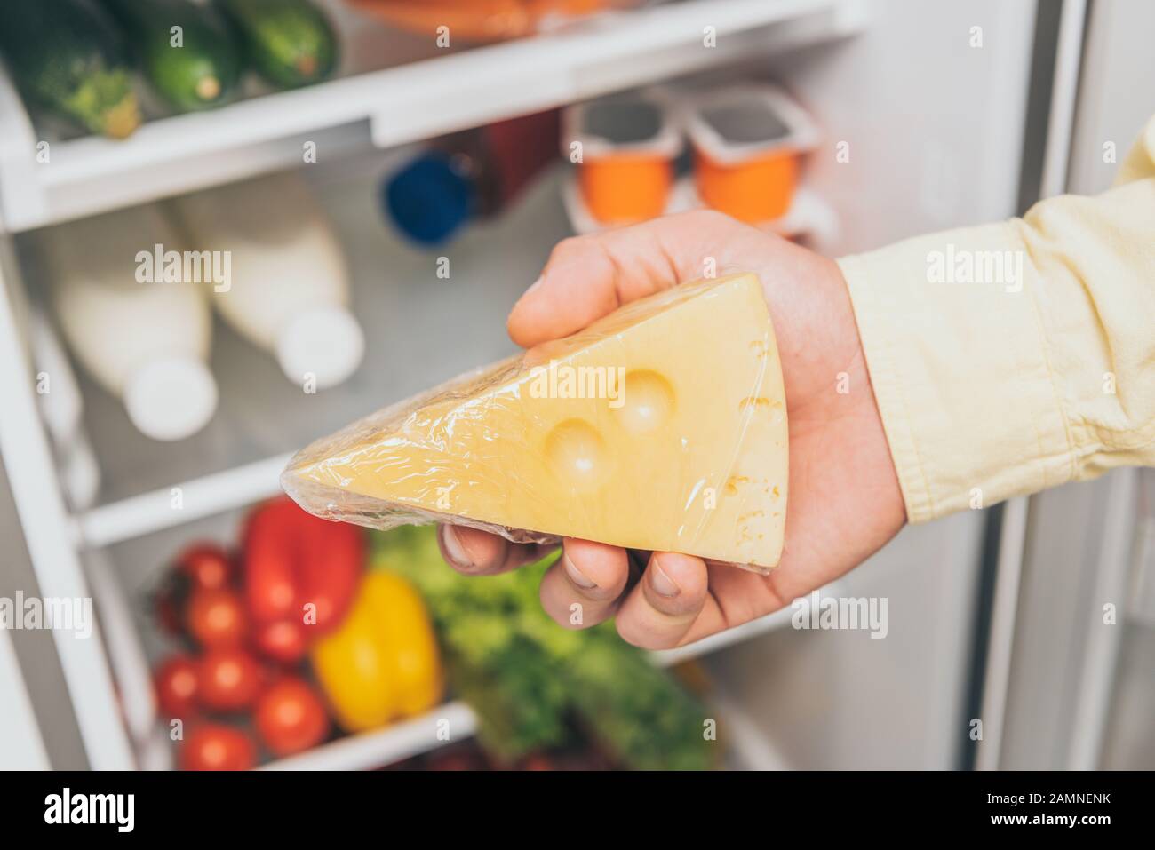 Man Holding Cheese High Resolution Stock Photography and Images - Alamy