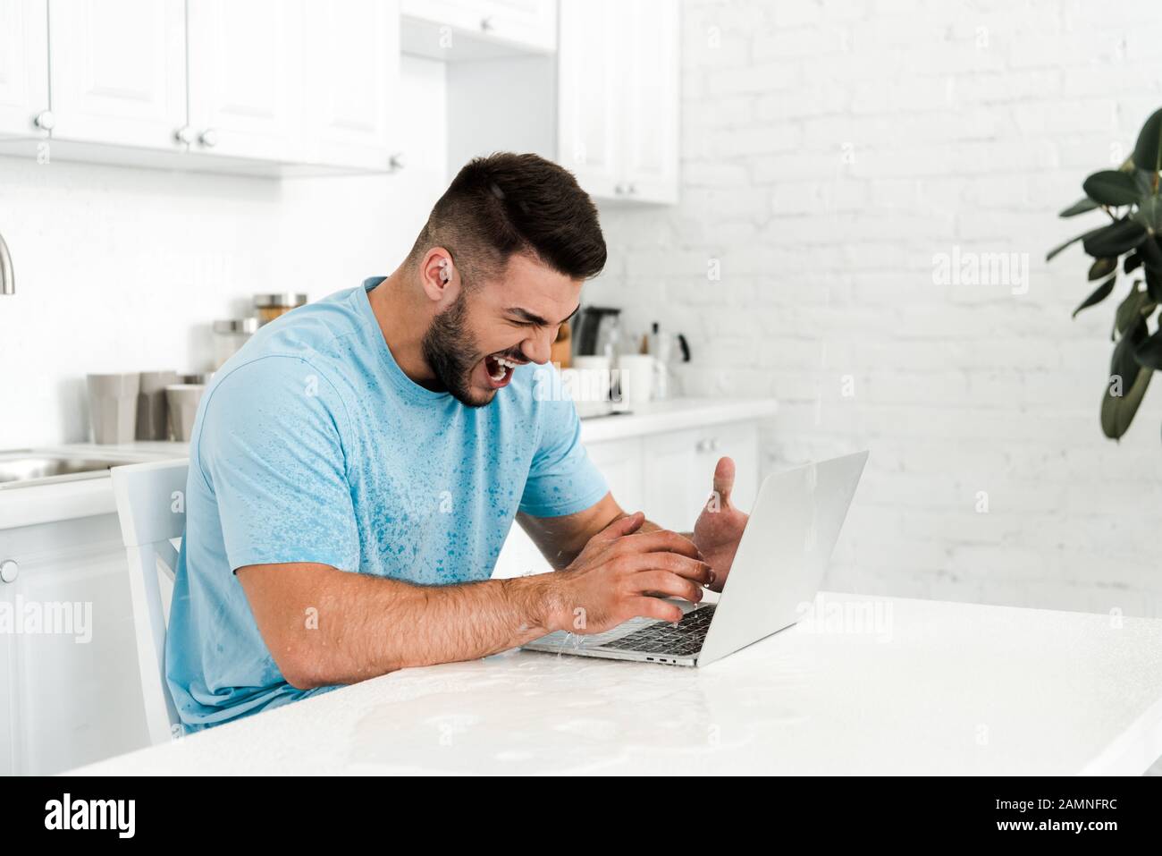 Man sitting in chair screaming hi-res stock photography and images - Alamy