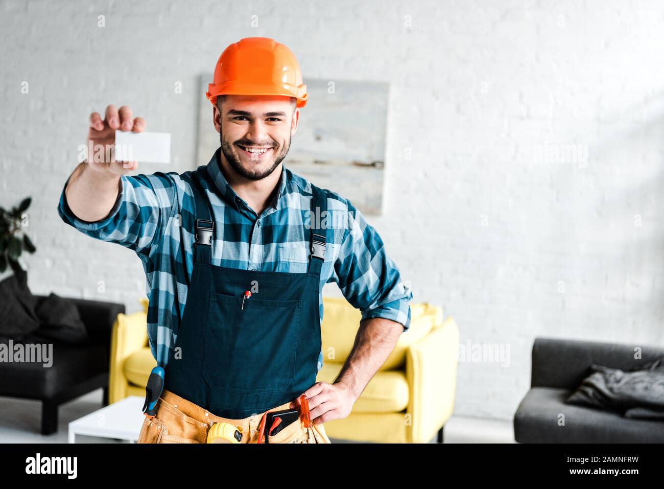 Cheerful worker hi-res stock photography and images - Alamy