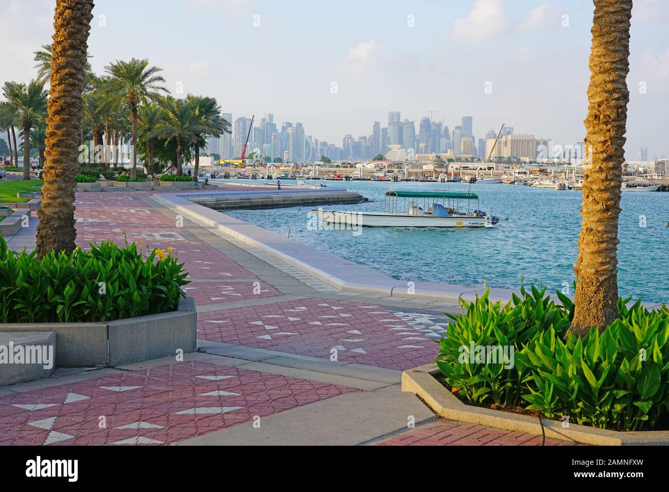 Corniche waterfront promenade in doha hi-res stock photography and ...