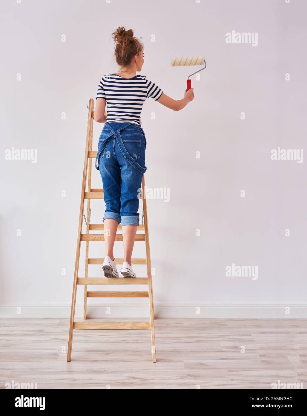 Decorate wall painting working hi-res stock photography and images - Alamy