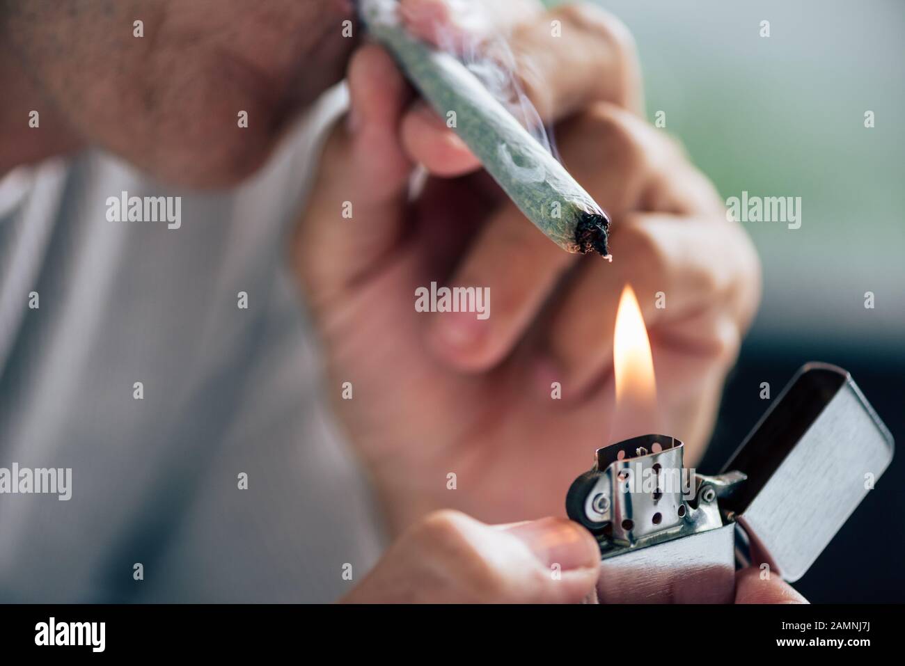 Man lighting up hi-res stock photography and images - Alamy