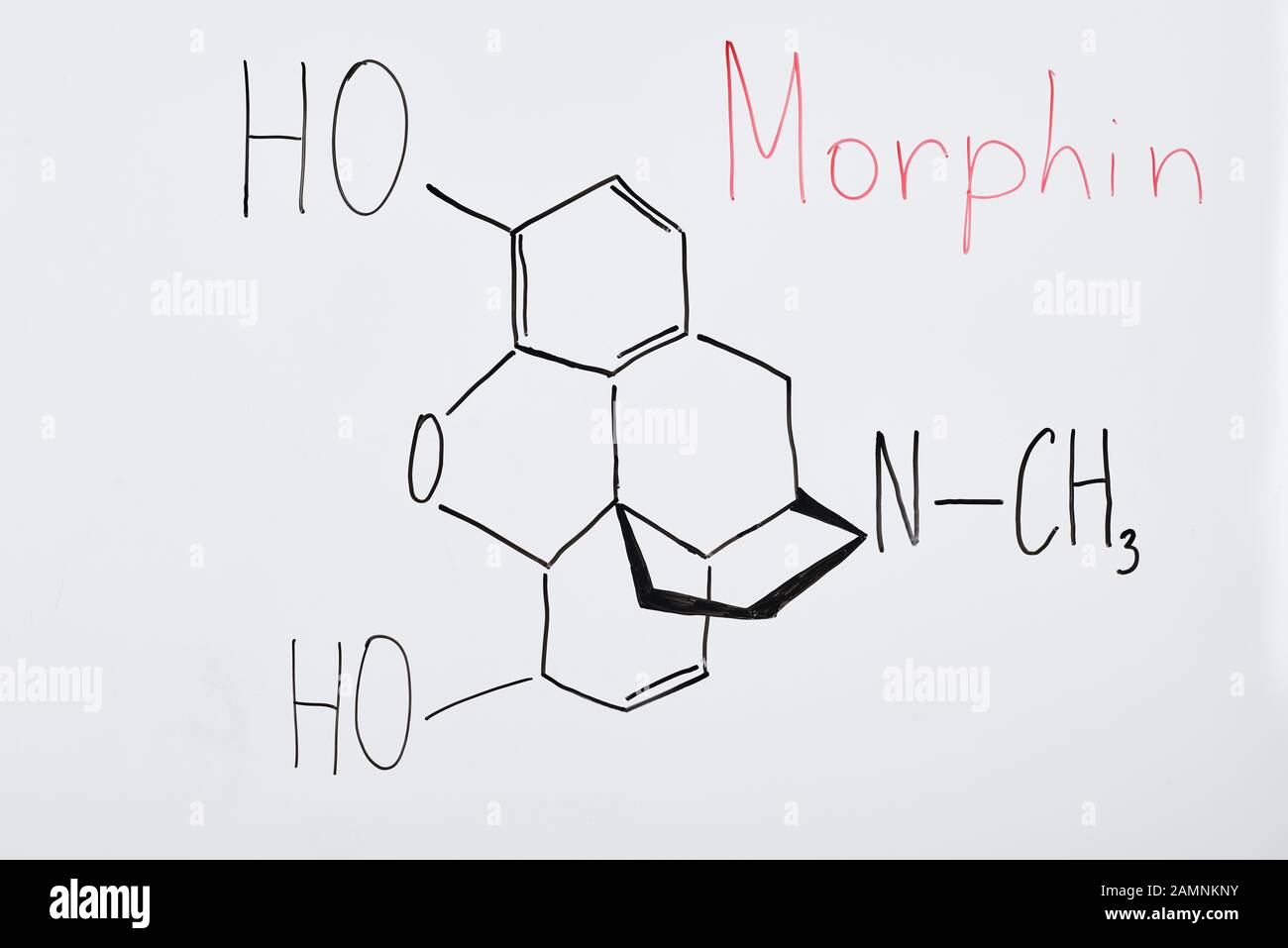 top view of white board with chemical formula and lettering morphin in ...