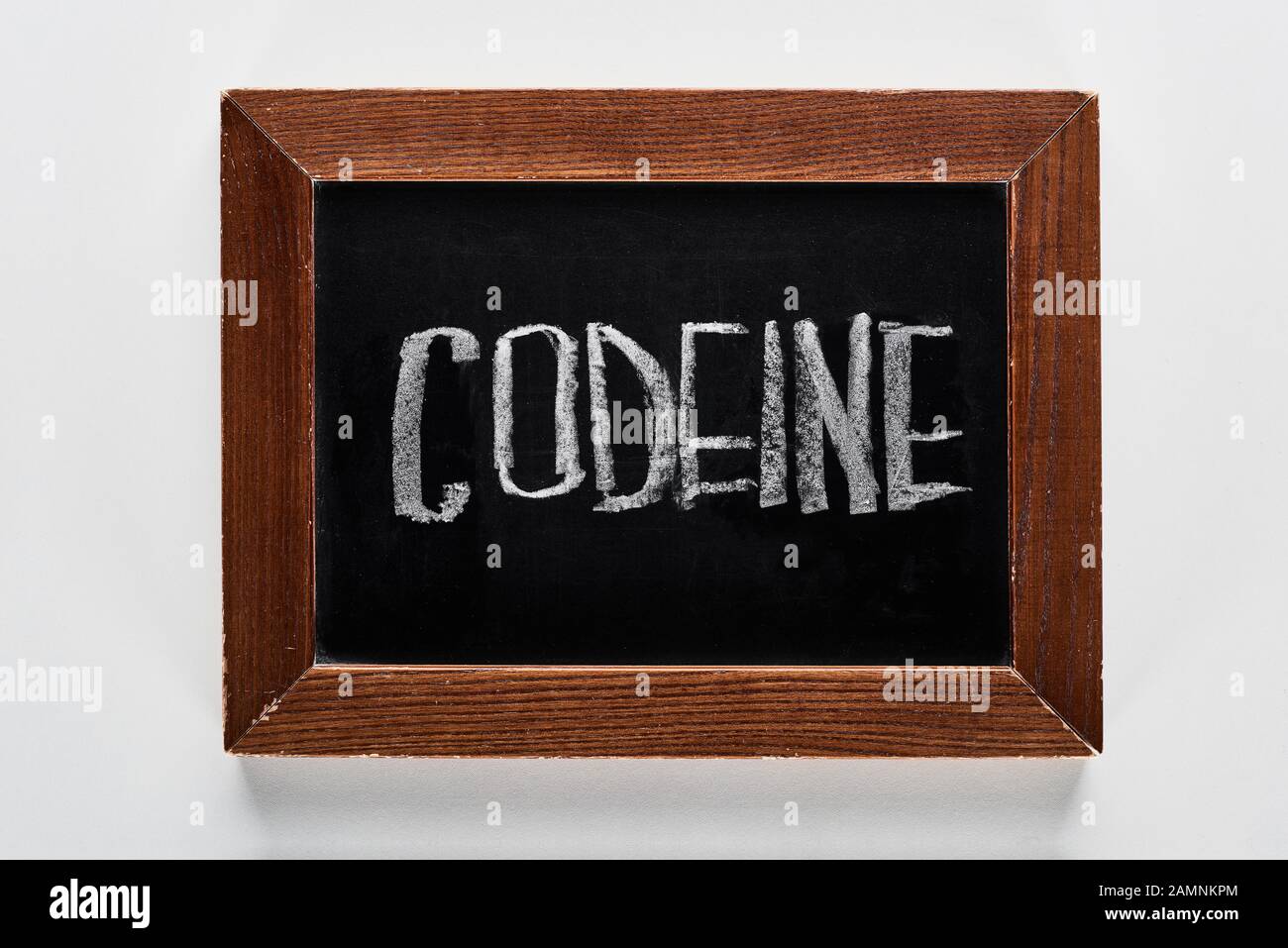 top view of black chalk board with lettering codeine Stock Photo - Alamy