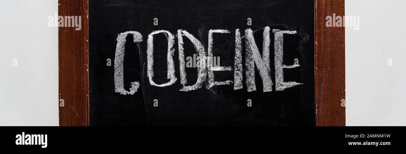 panoramic shot of black chalk board with lettering codeine Stock Photo ...