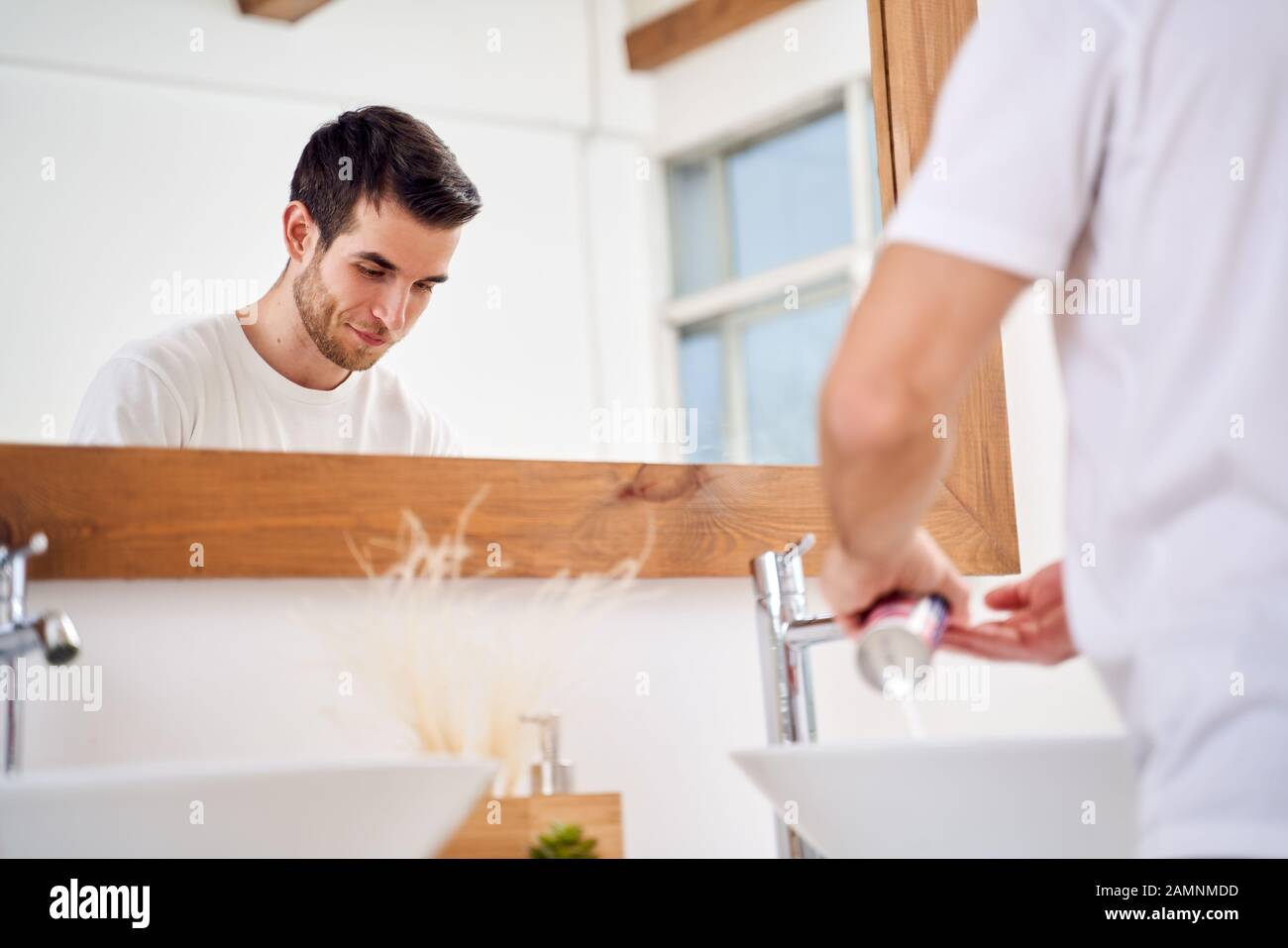 Young man washing hands hi-res stock photography and images - Alamy