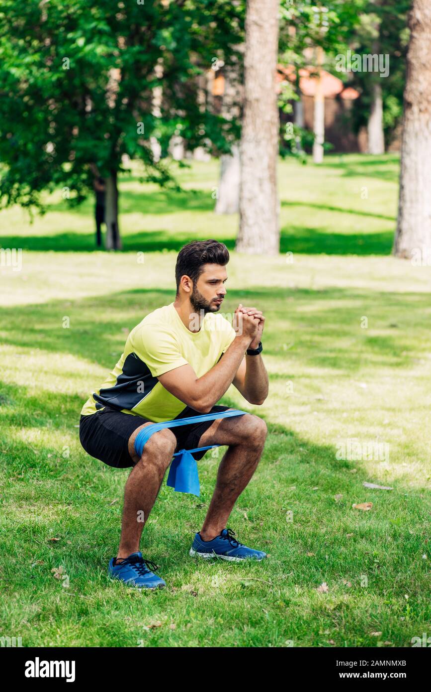 Bearded man working out suspension hi-res stock photography and images ...