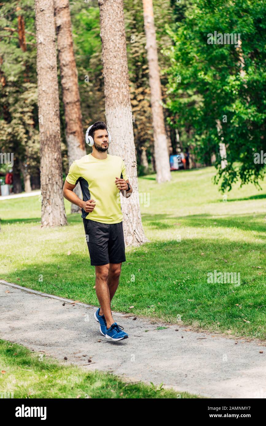 Athletic bearded man running in hi-res stock photography and images - Alamy