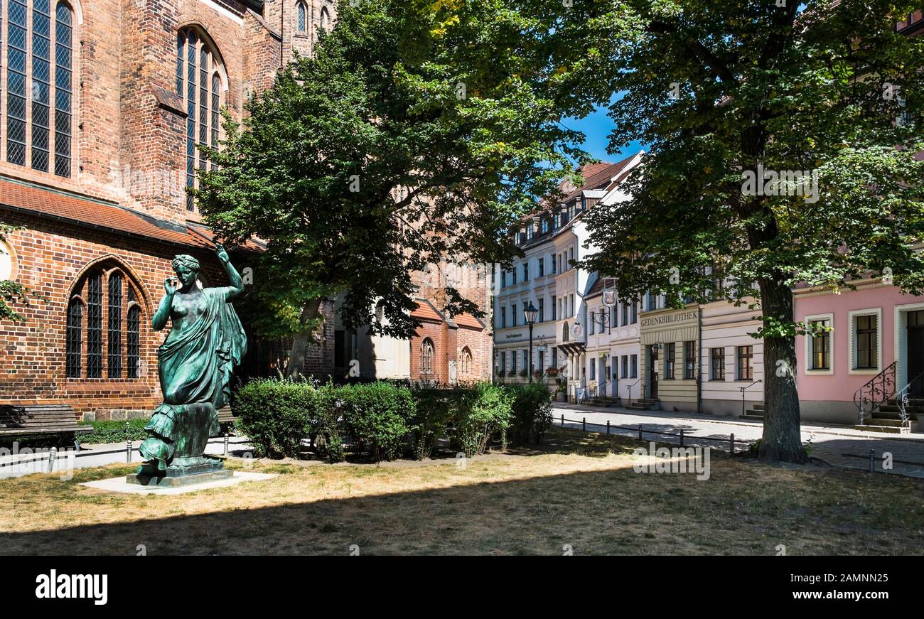 greek muse clio, statue in front of st nicholas church Stock Photo - Alamy