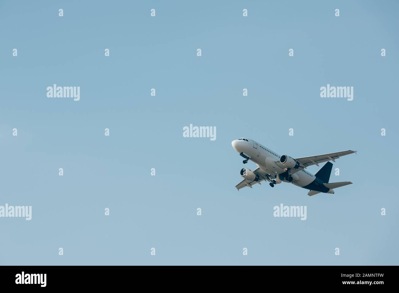 Airplane taking off in blue hi-res stock photography and images - Alamy