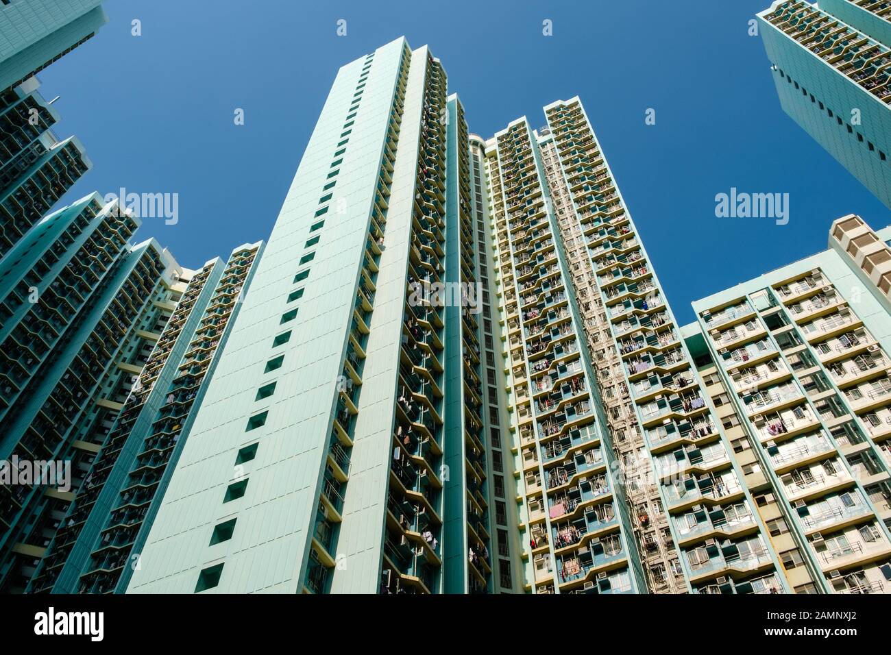 looking up on high-rise apartment building, residential building facade ...
