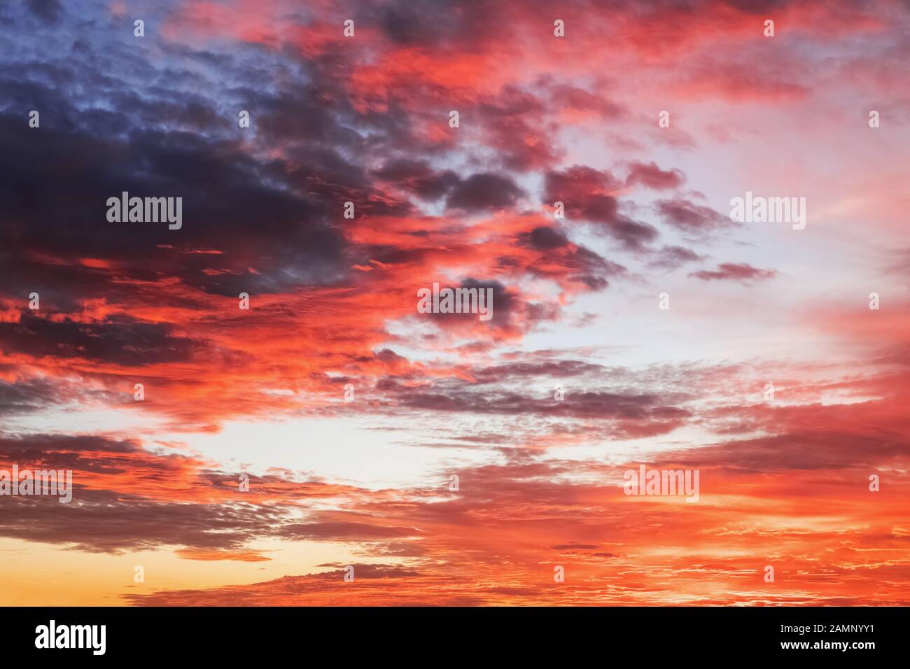 Beautiful dramatic red sunset sky with stormy clouds Stock Photo - Alamy