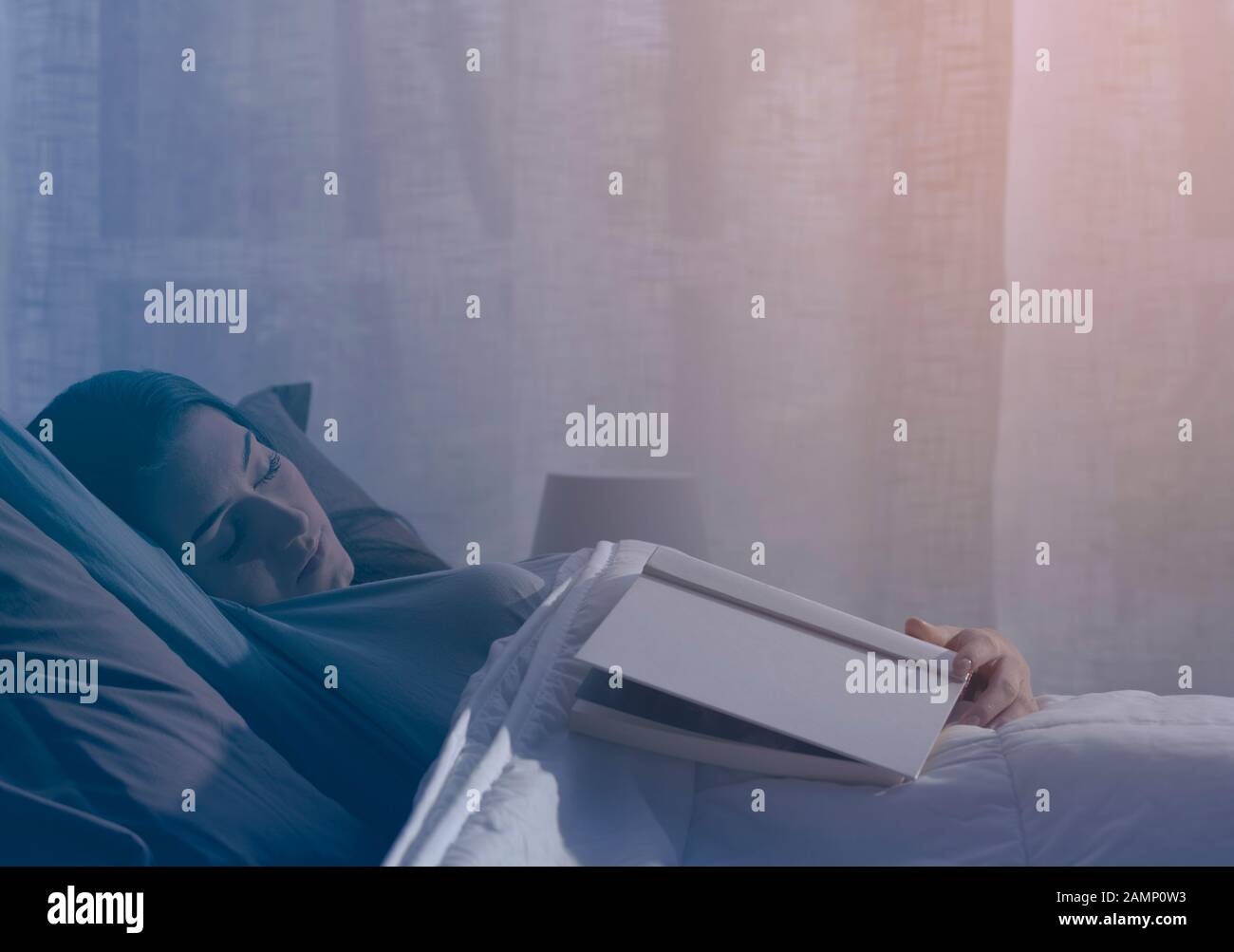 Teenager sleeping late in bed hi-res stock photography and images - Alamy