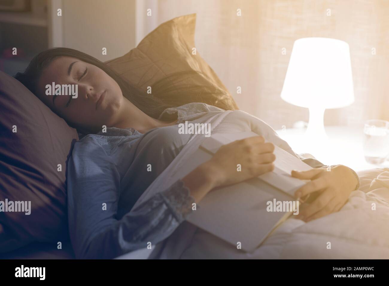 Teenager sleeping late in bed hi-res stock photography and images - Alamy