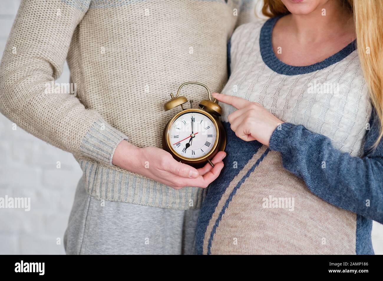 Young couple expecting baby. Pregnant woman with husband. pregnancy ...