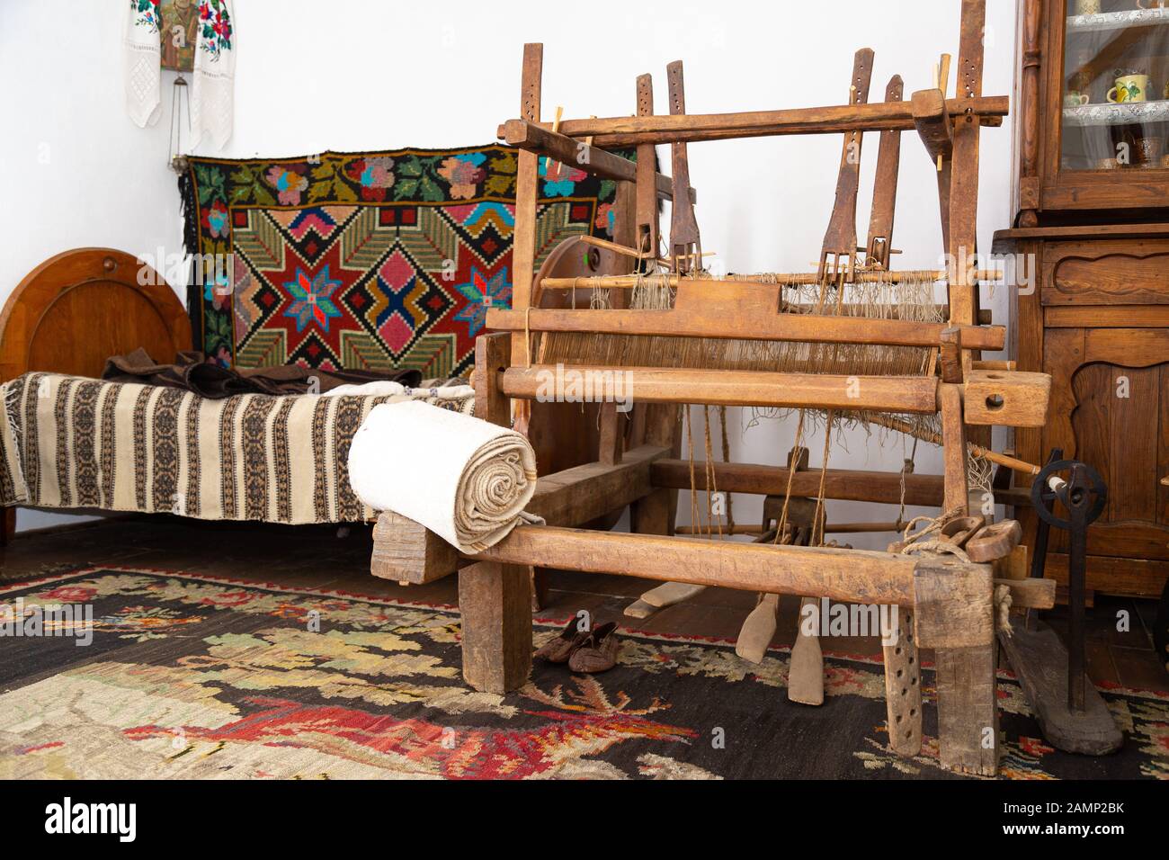 Old traditional wooden weaving loom on old traditional Romanian house ...