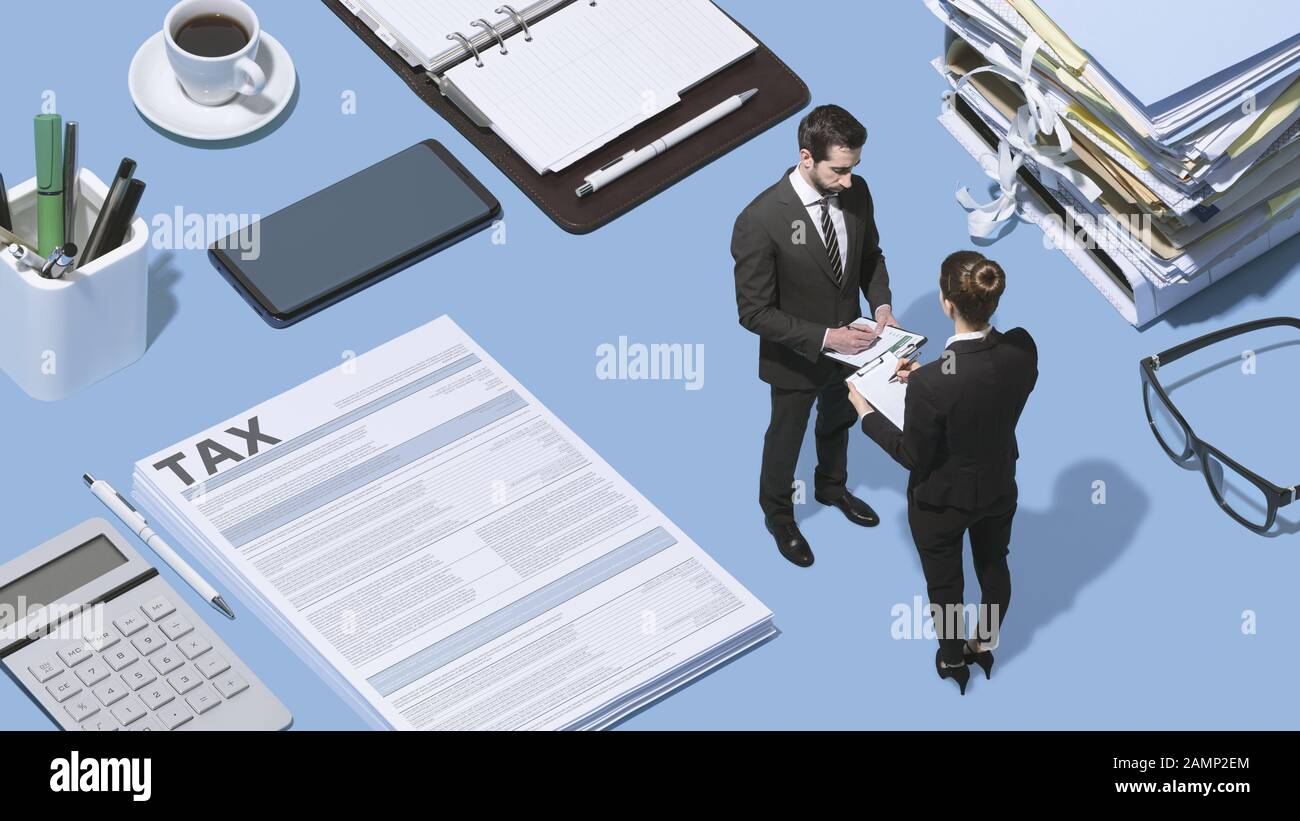 Accountant tax forms meeting hi-res stock photography and images - Alamy