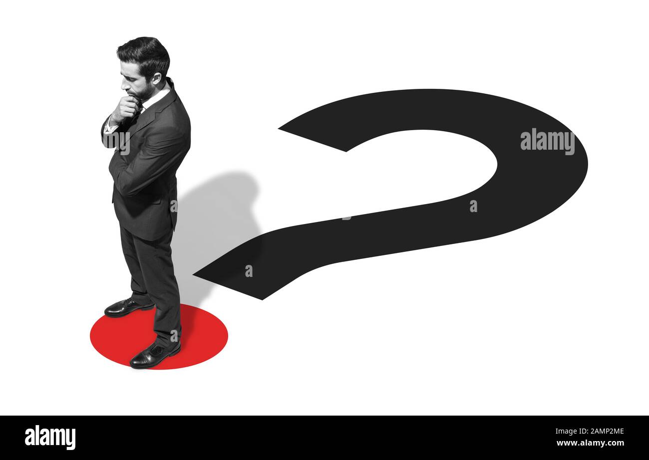 Corporate businessman standing on a question mark and thinking about ...