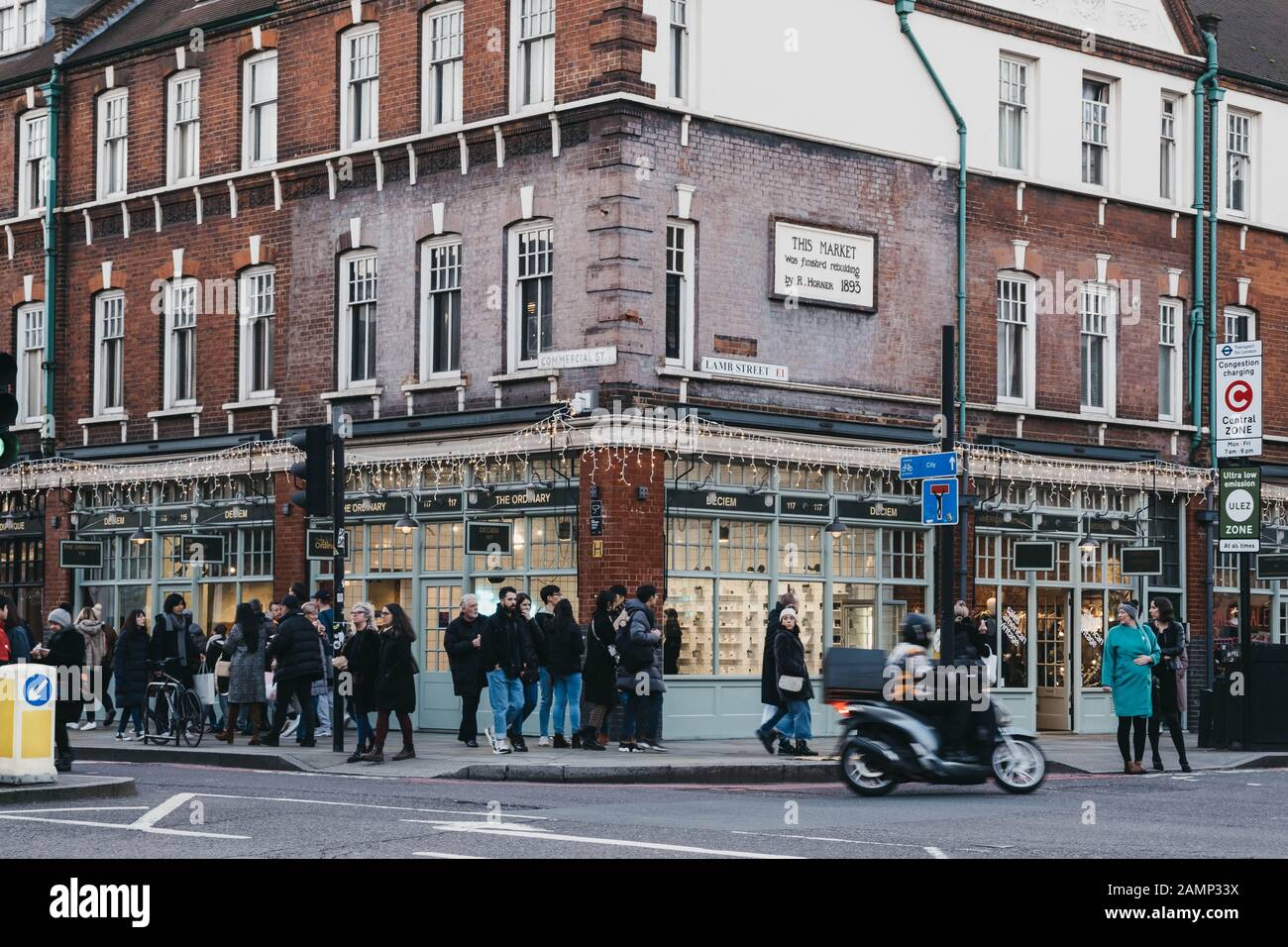 London, UK - December 29, 2019: People by Spitalfields Market, one of ...