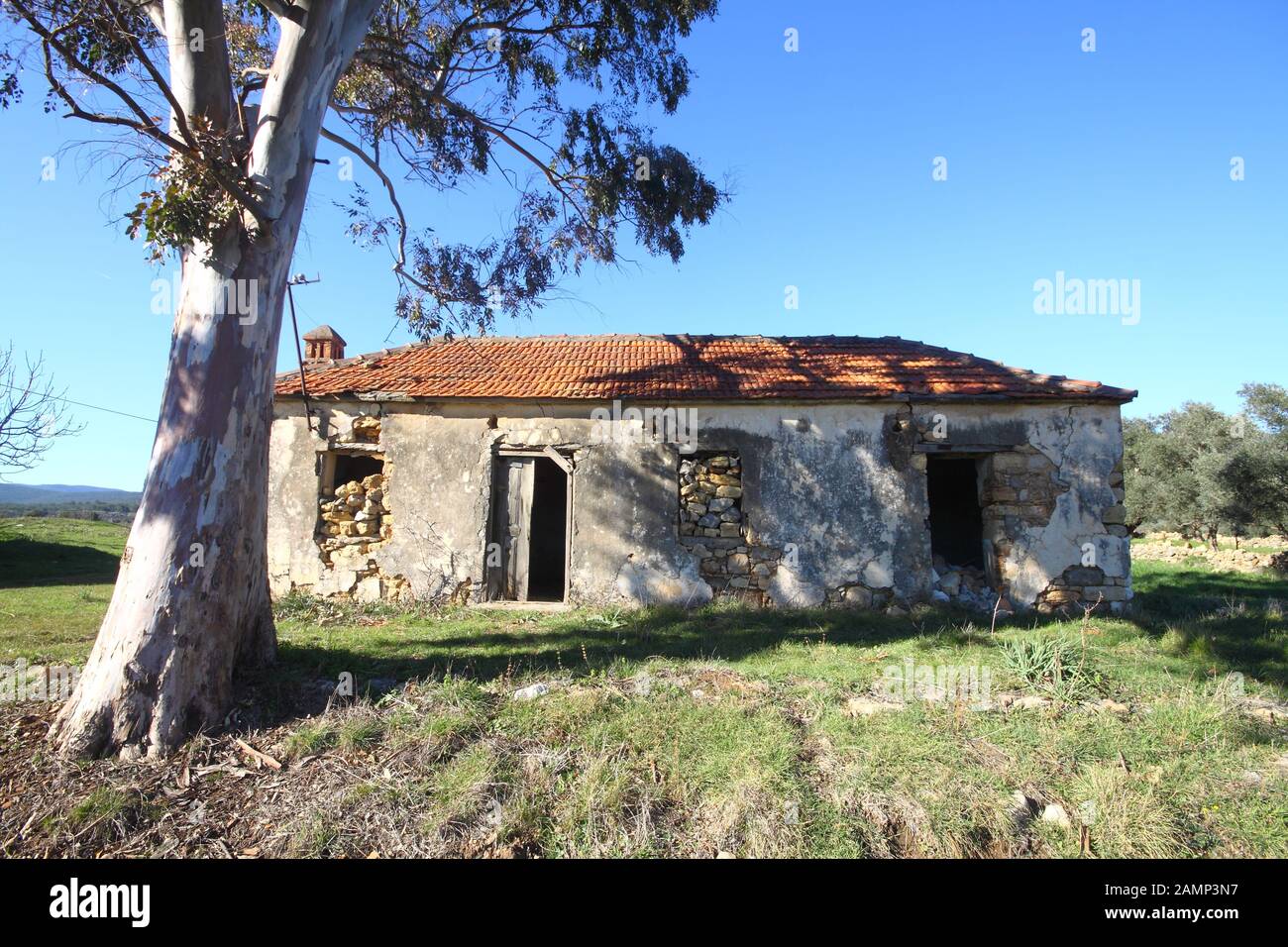 An old house built with bricks and stone A simple village architecture ...