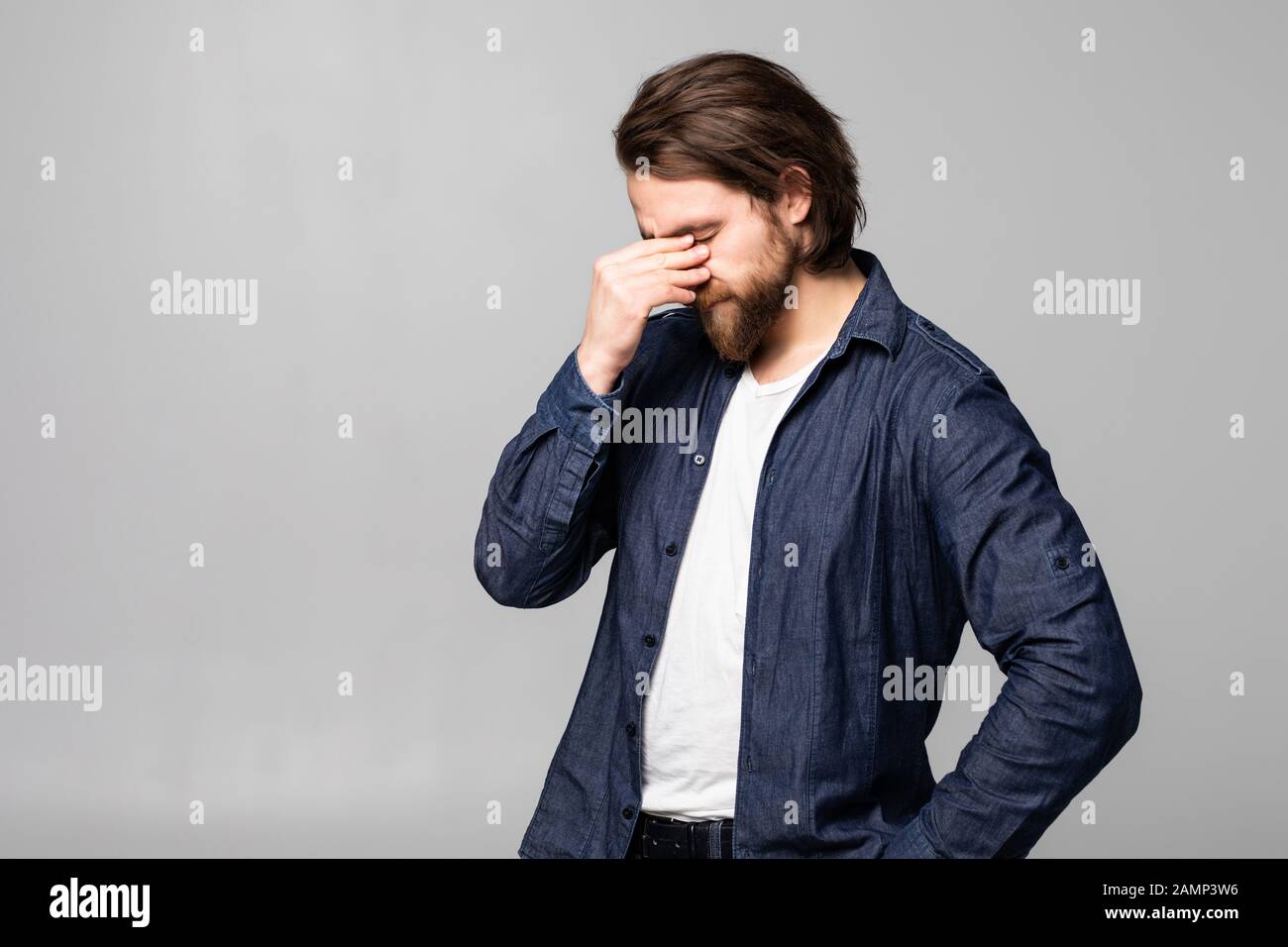 Young man in depression. Isolated white background Stock Photo - Alamy