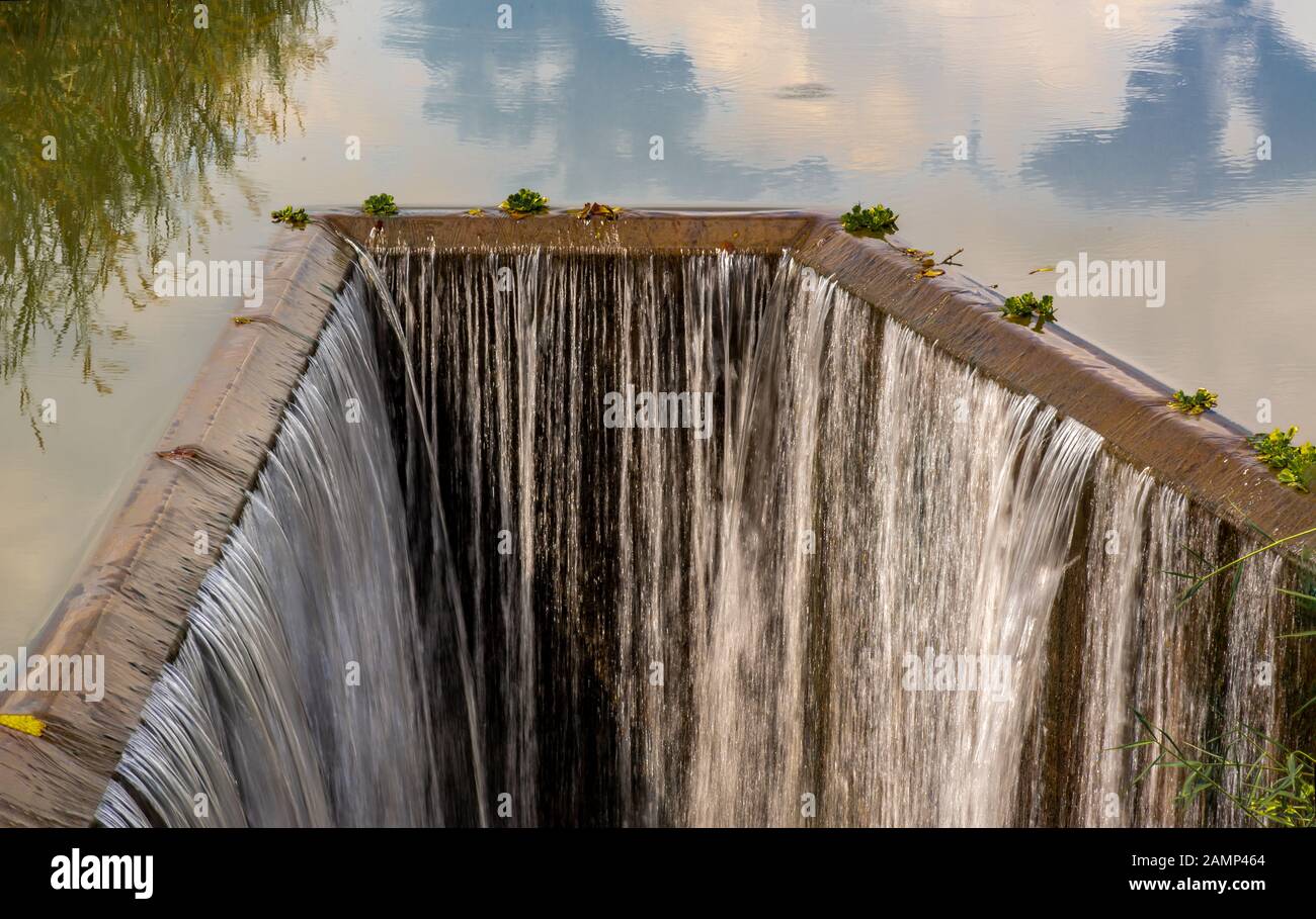 Turbid water in the check dam overflows into the spillway, Man-made ...