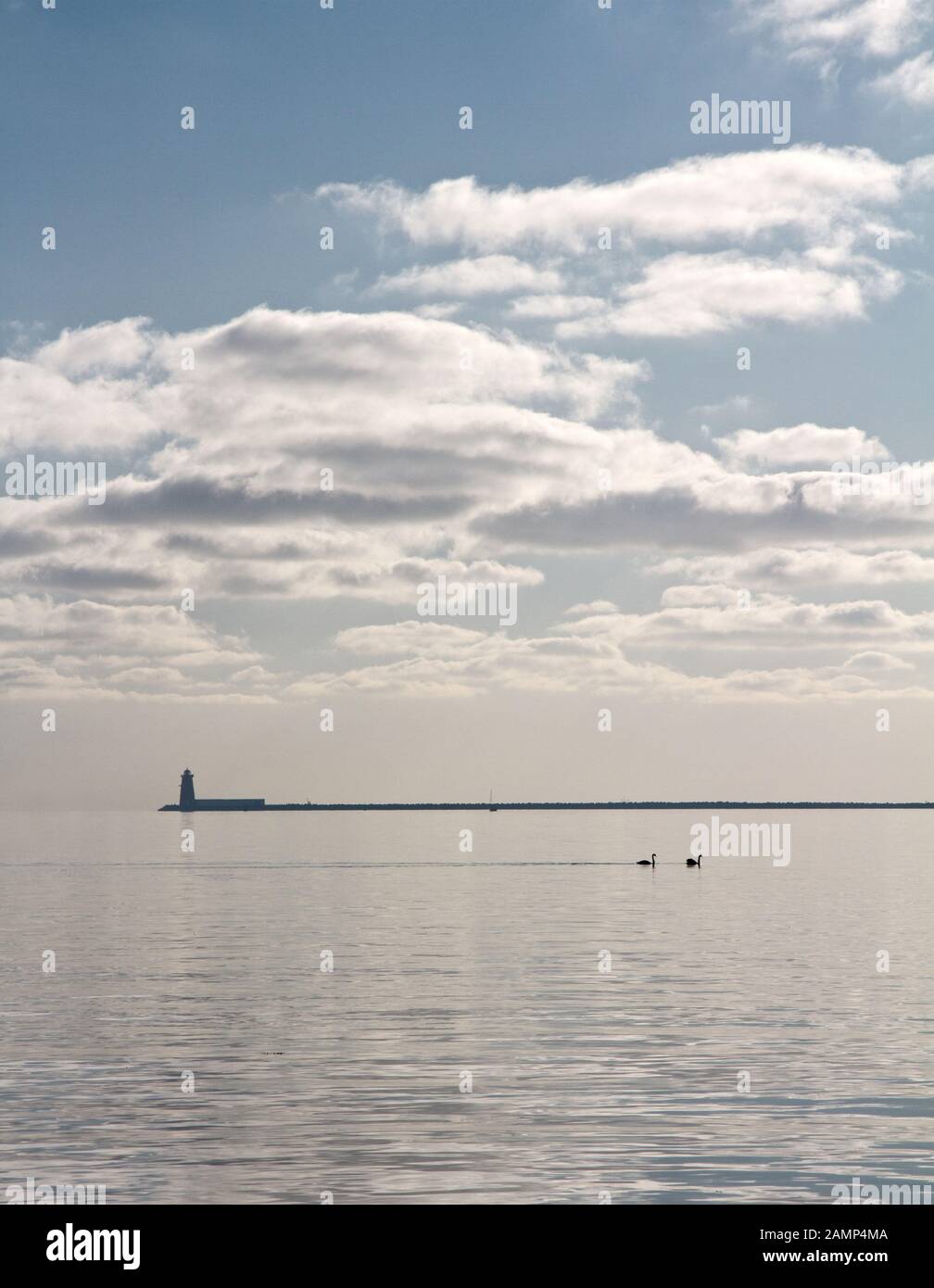 Poolbeg Lighthouse at the end of the Great South Wall pictured from ...